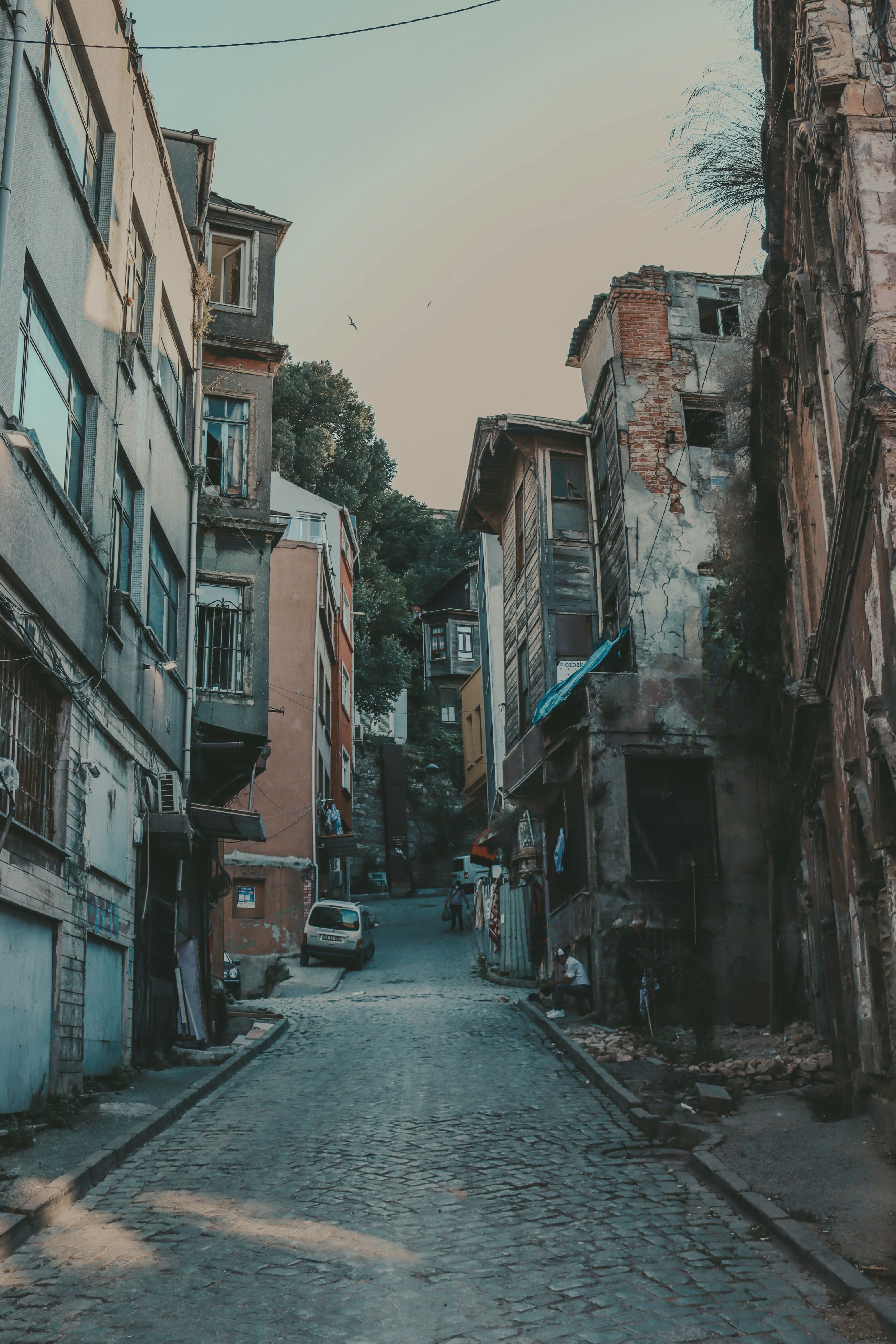 A Narrow Street Between Houses · Free Stock Photo