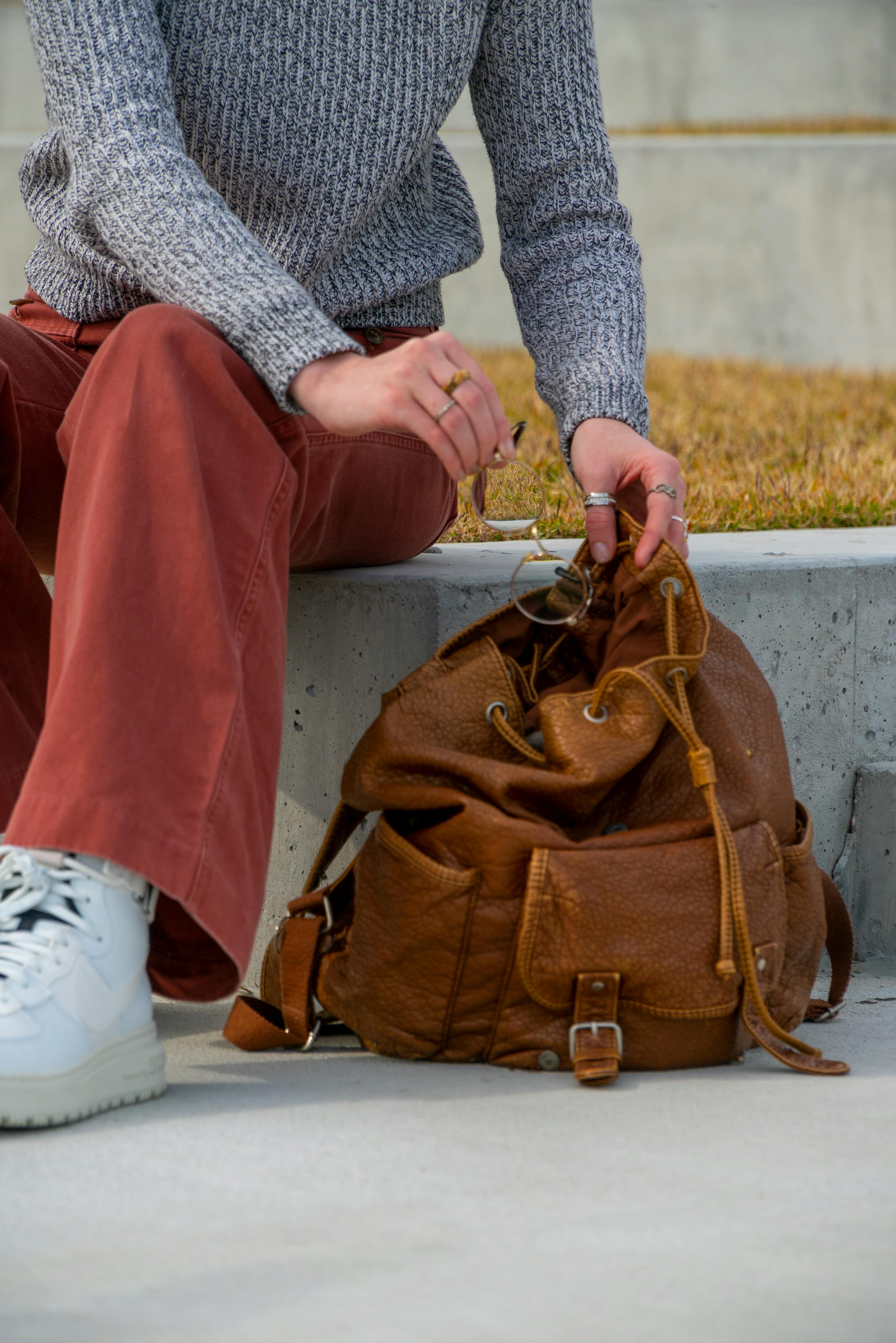 Person Holding Black Backpack · Free Stock Photo