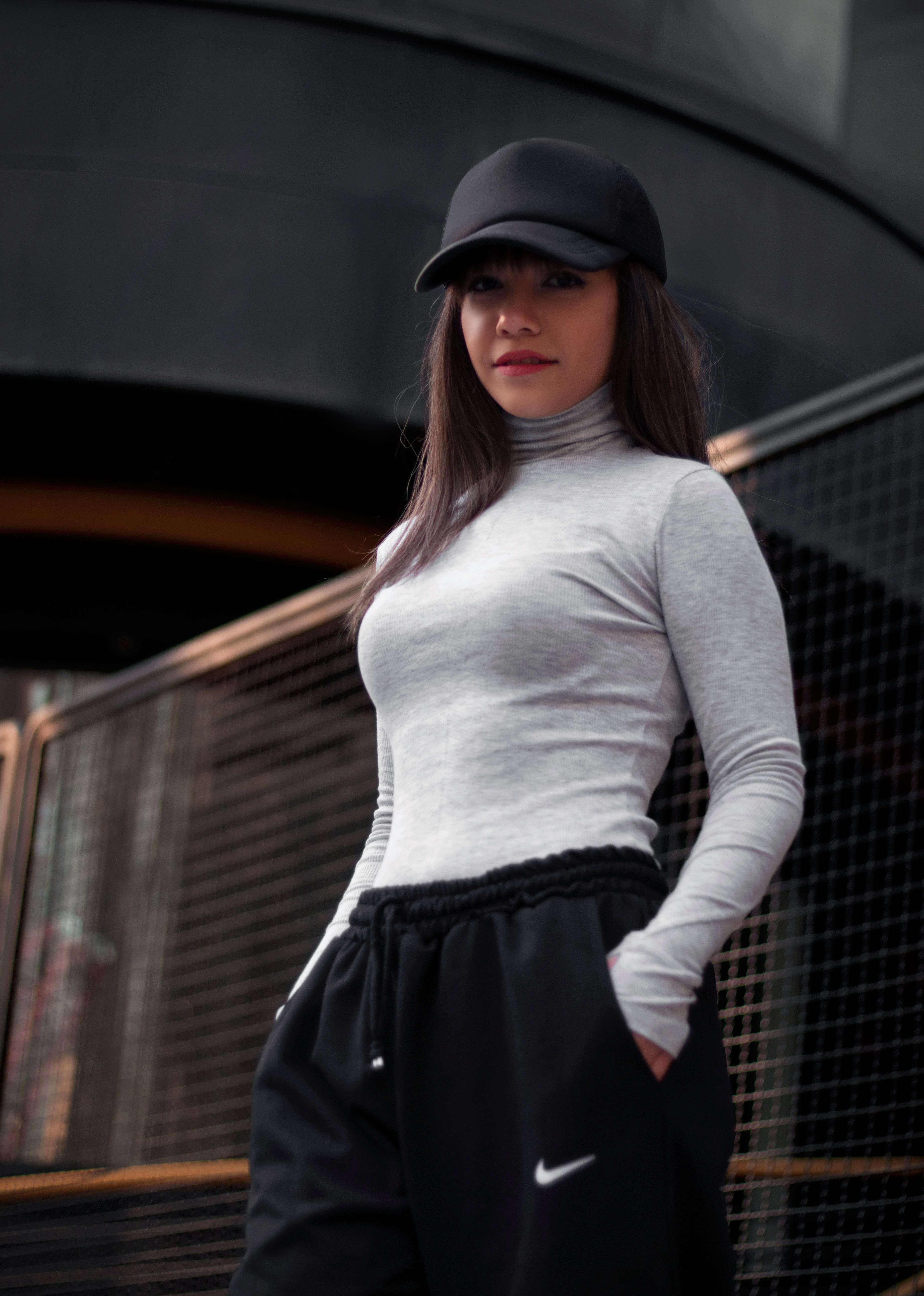 Woman in Gray Long Sleeve Shirt and Black Cap · meta.free_stock.photo