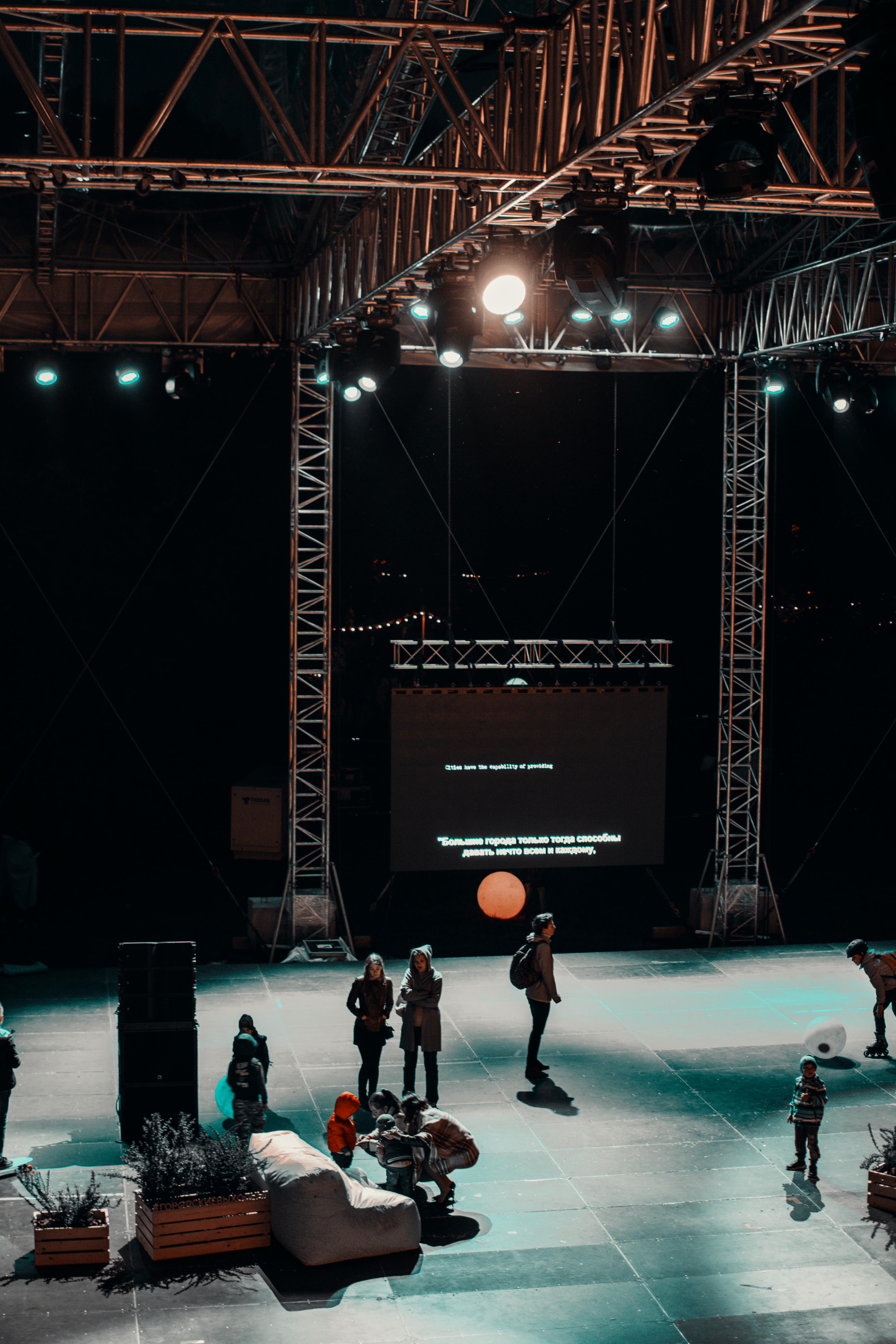 Group of People Standing on Stage · Free Stock Photo