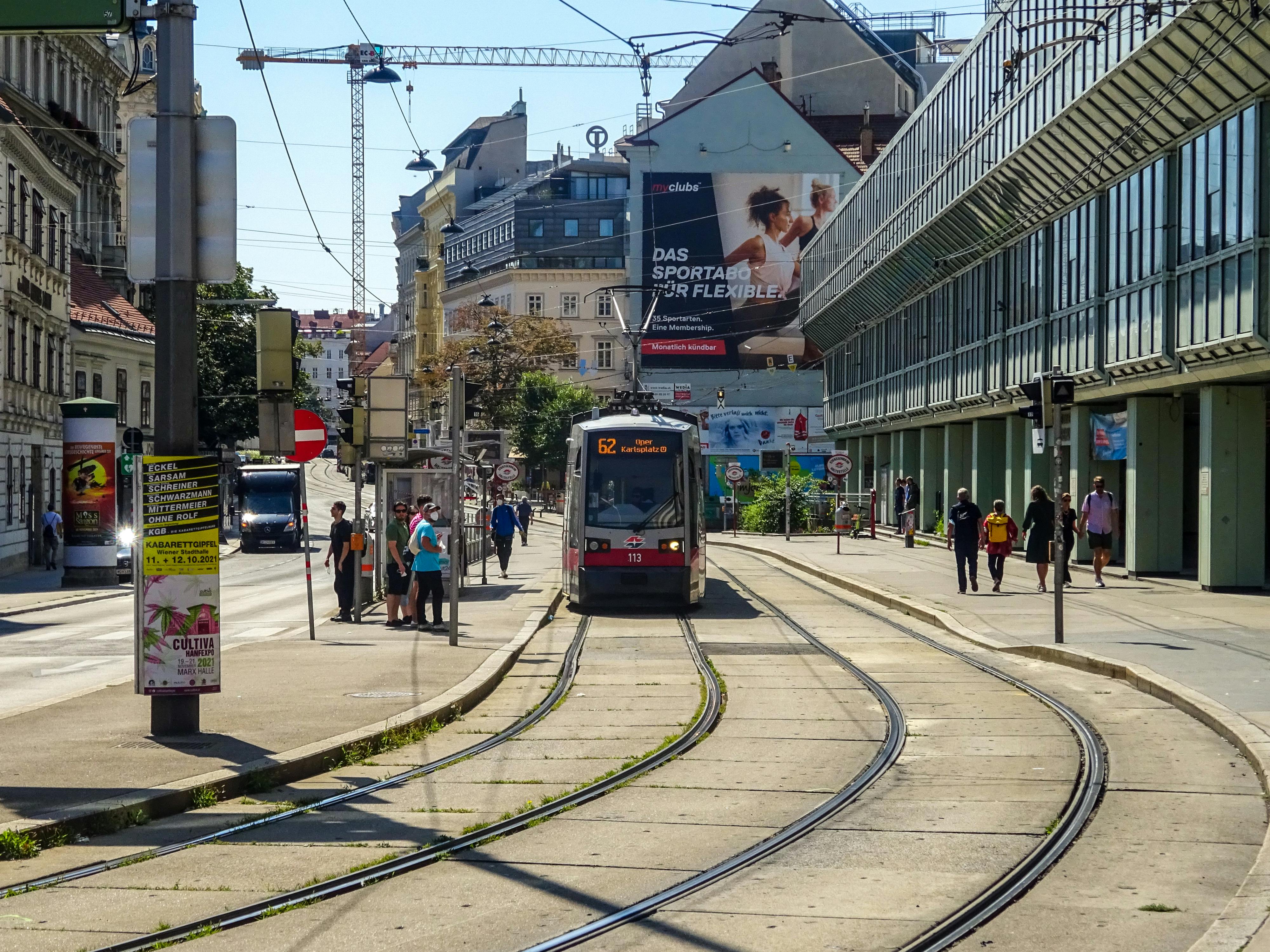 Photo of Vehicles and Tram on Road · Free Stock Photo