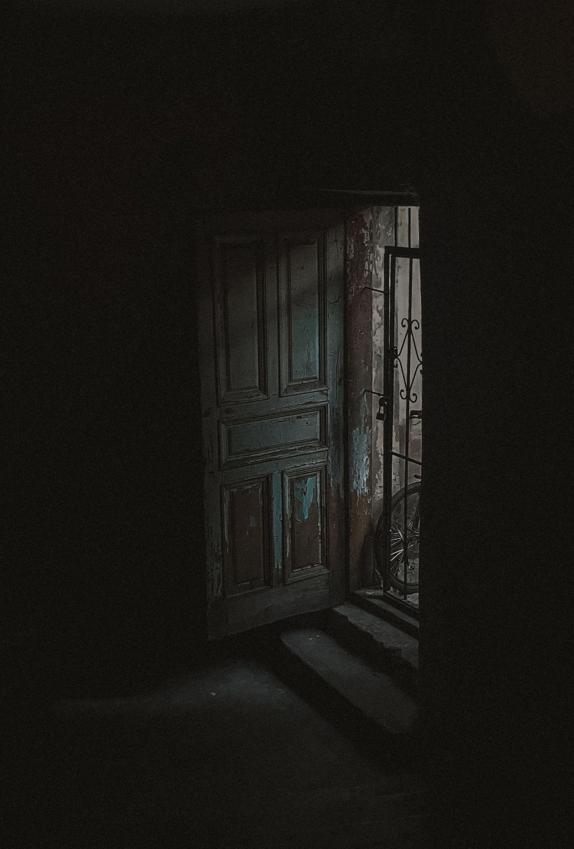 A Brown Wooden Door Propped Open · Free Stock Photo
