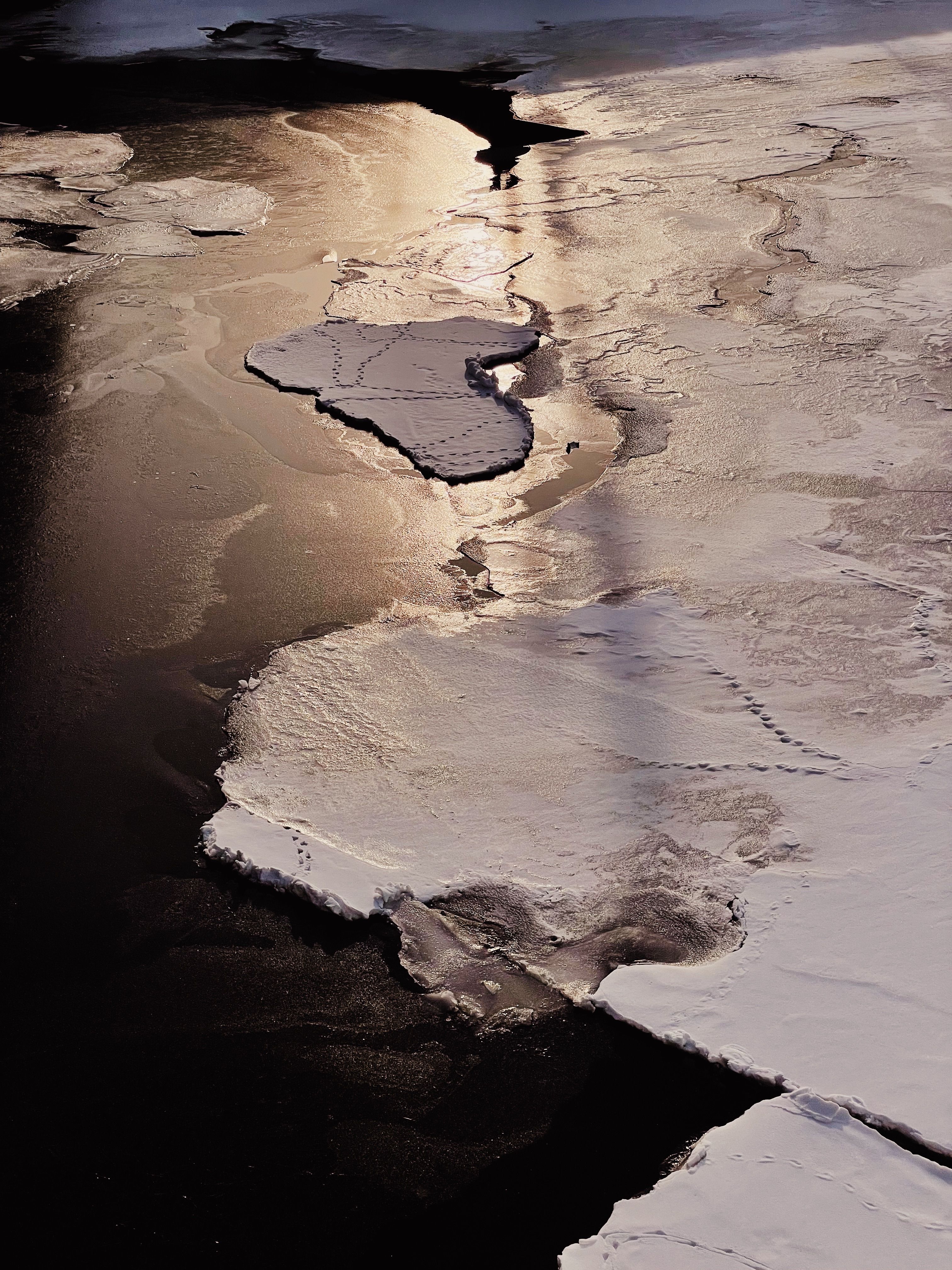 Crack on Ice Surface at Sunset · Free Stock Photo