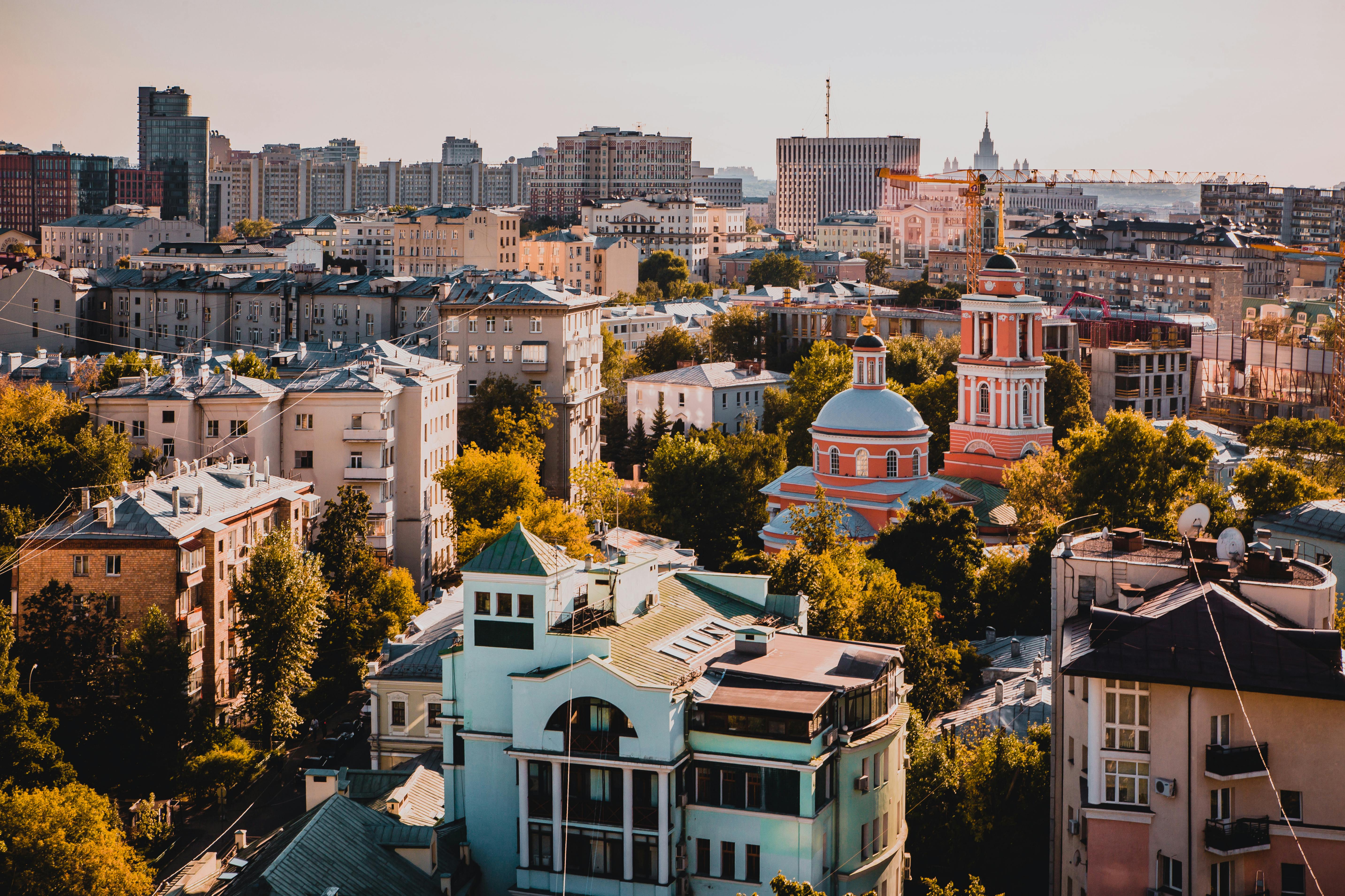 Orthodox Church Towers behind Trees with Spring Blossoms · Free Stock Photo