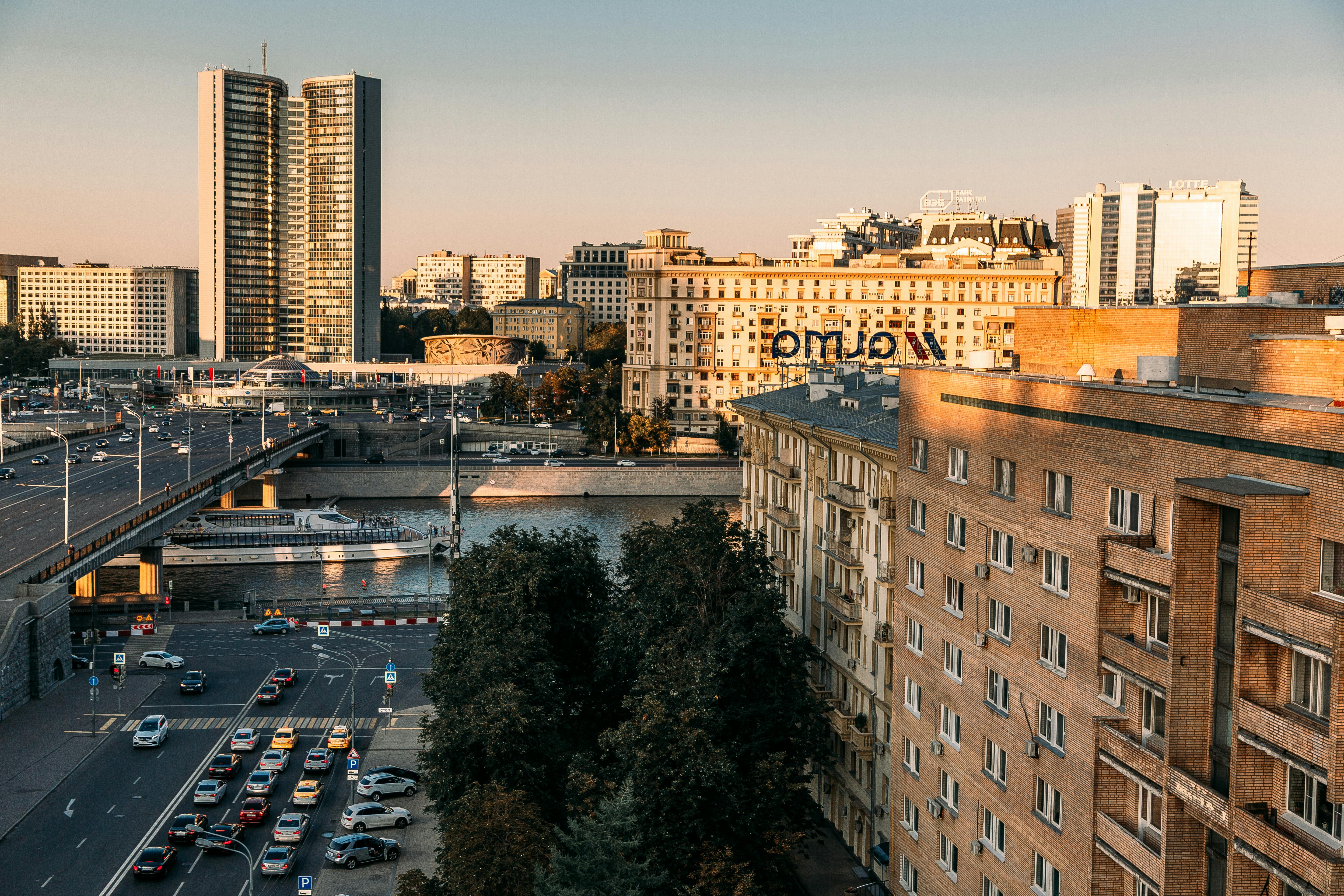 High Rise Buildings Near Trees and Road · Free Stock Photo