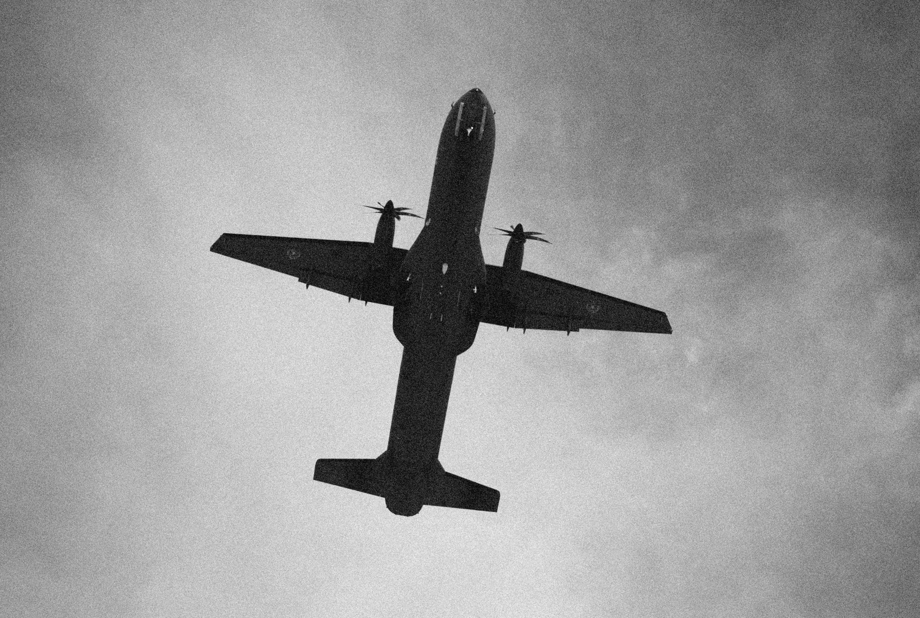 Black Jet Plane in Grayscale Photography · Free Stock Photo