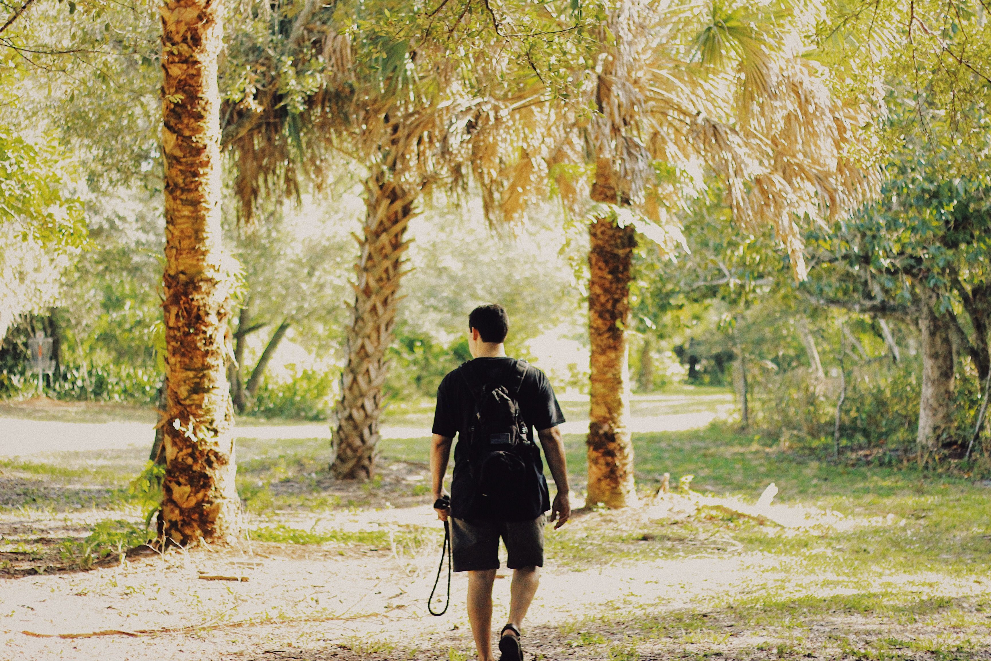 Photo of Men Walking Together · Free Stock Photo