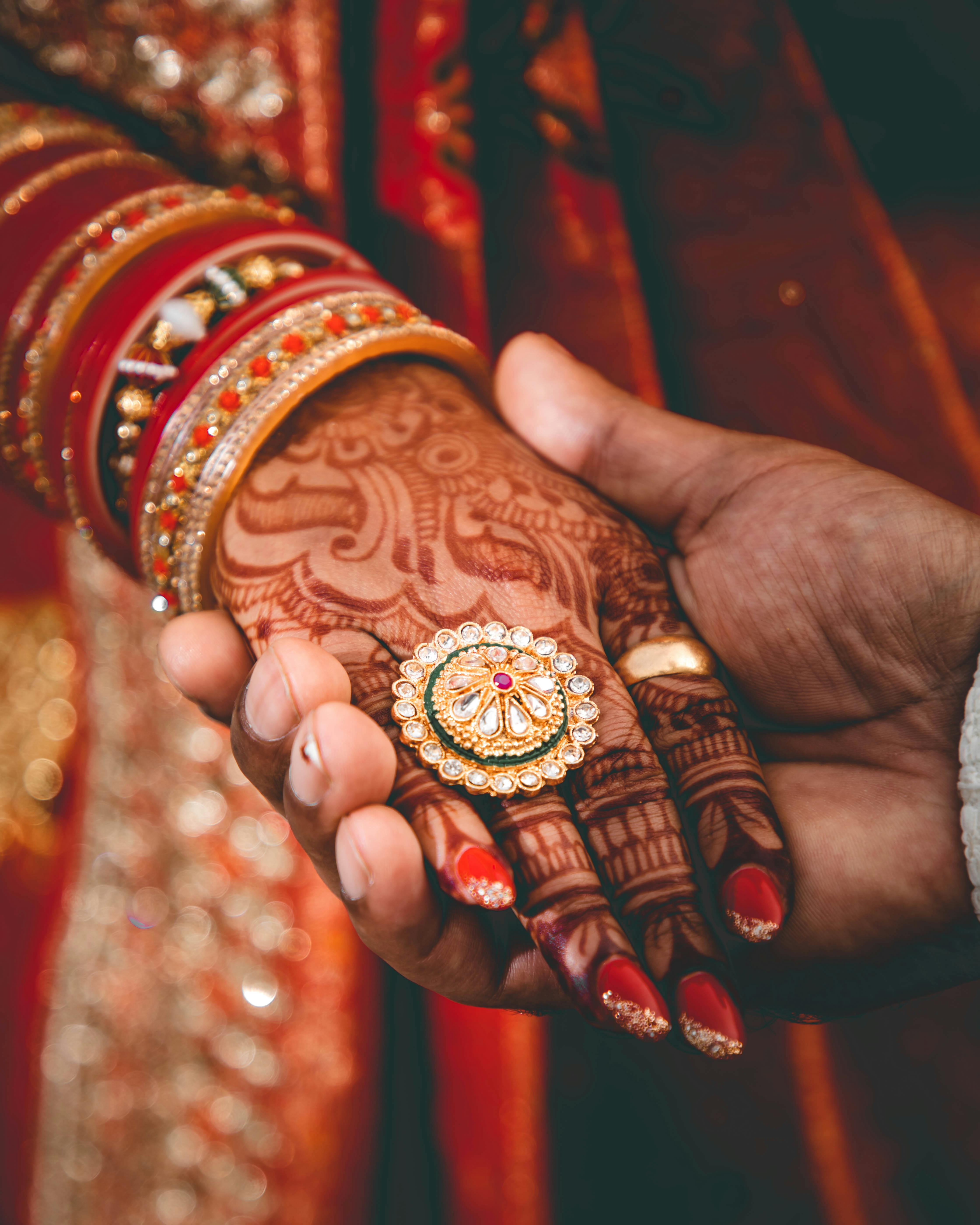 A Person Wearing a Ring with Diamonds · Free Stock Photo