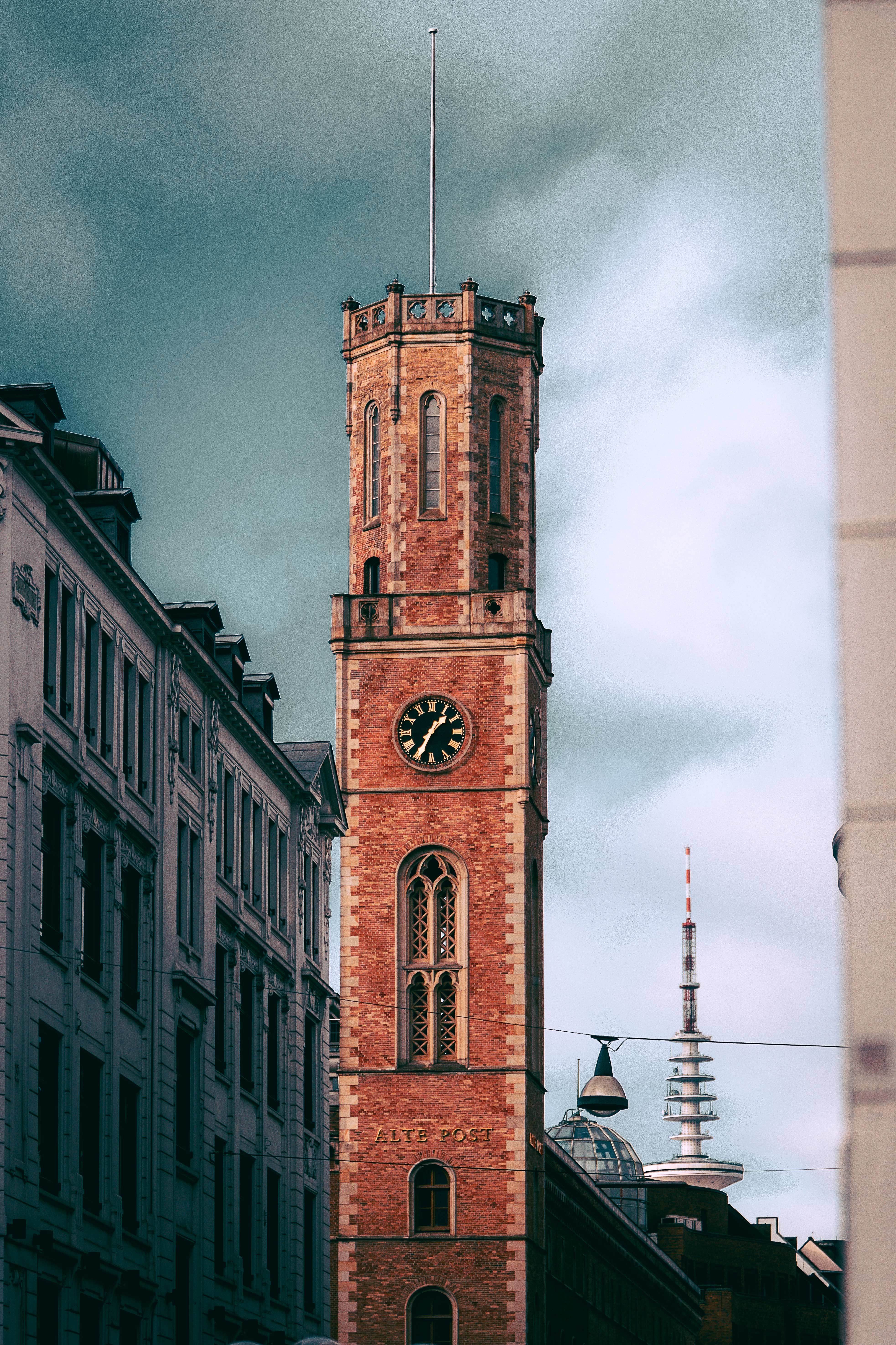 Photo of a Brown Clock Tower · Free Stock Photo