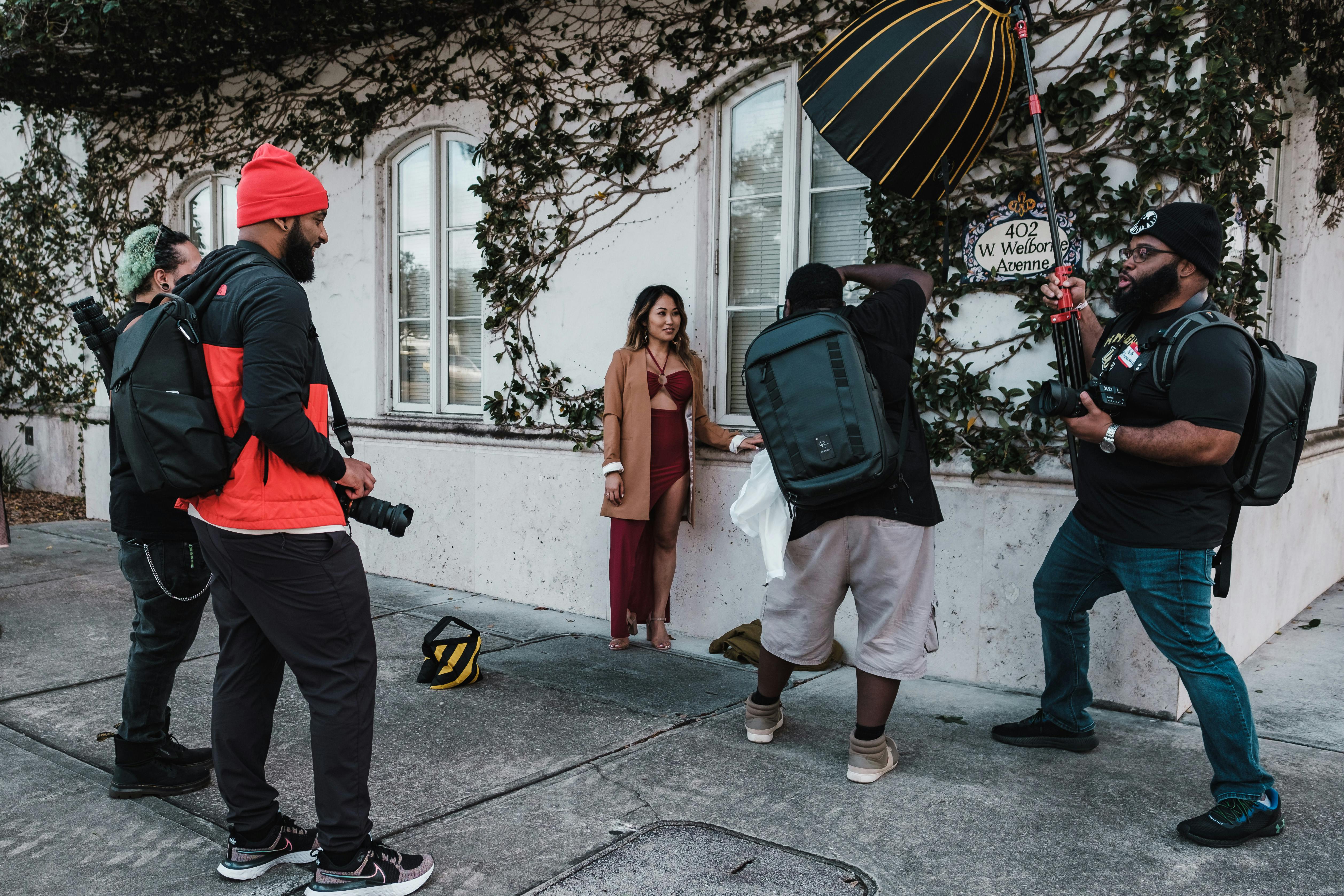 A Group of People Photo Shoot in the Street · Free Stock Photo