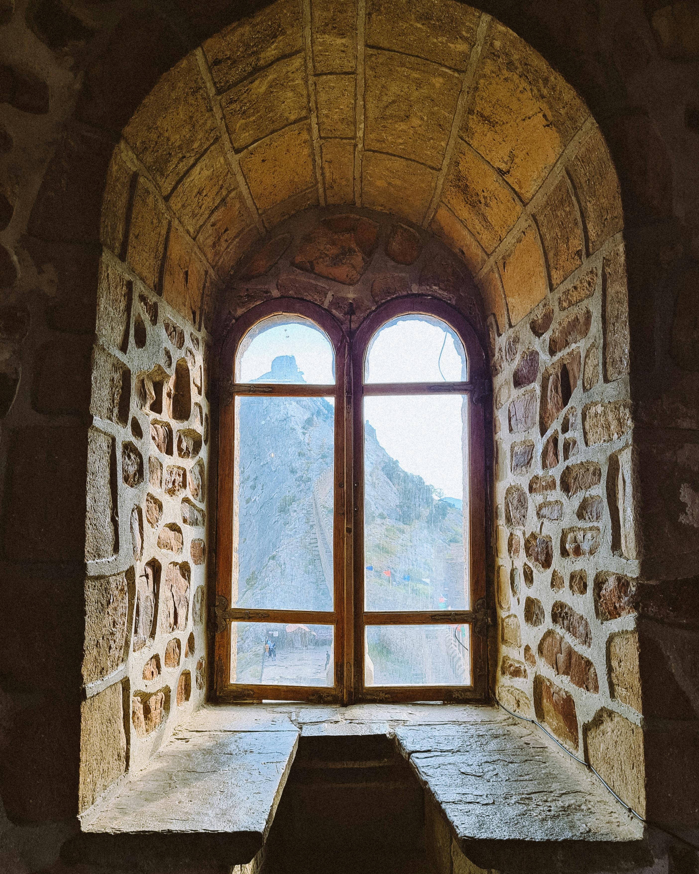 View of the Window in a Thick Stone Wall · Free Stock Photo