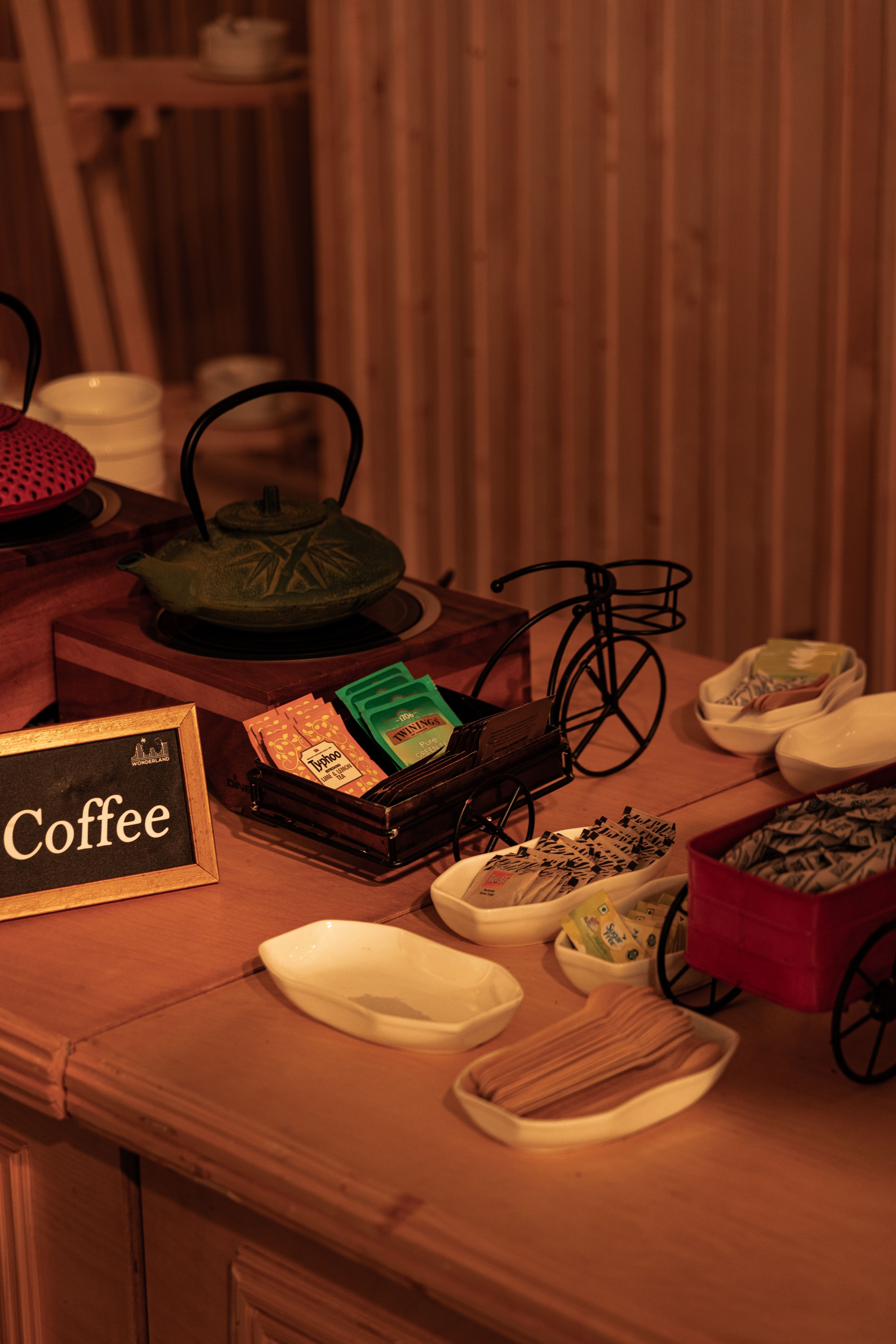 Indoor view of wooden table with tea and coffee in cafe · Free Stock Photo