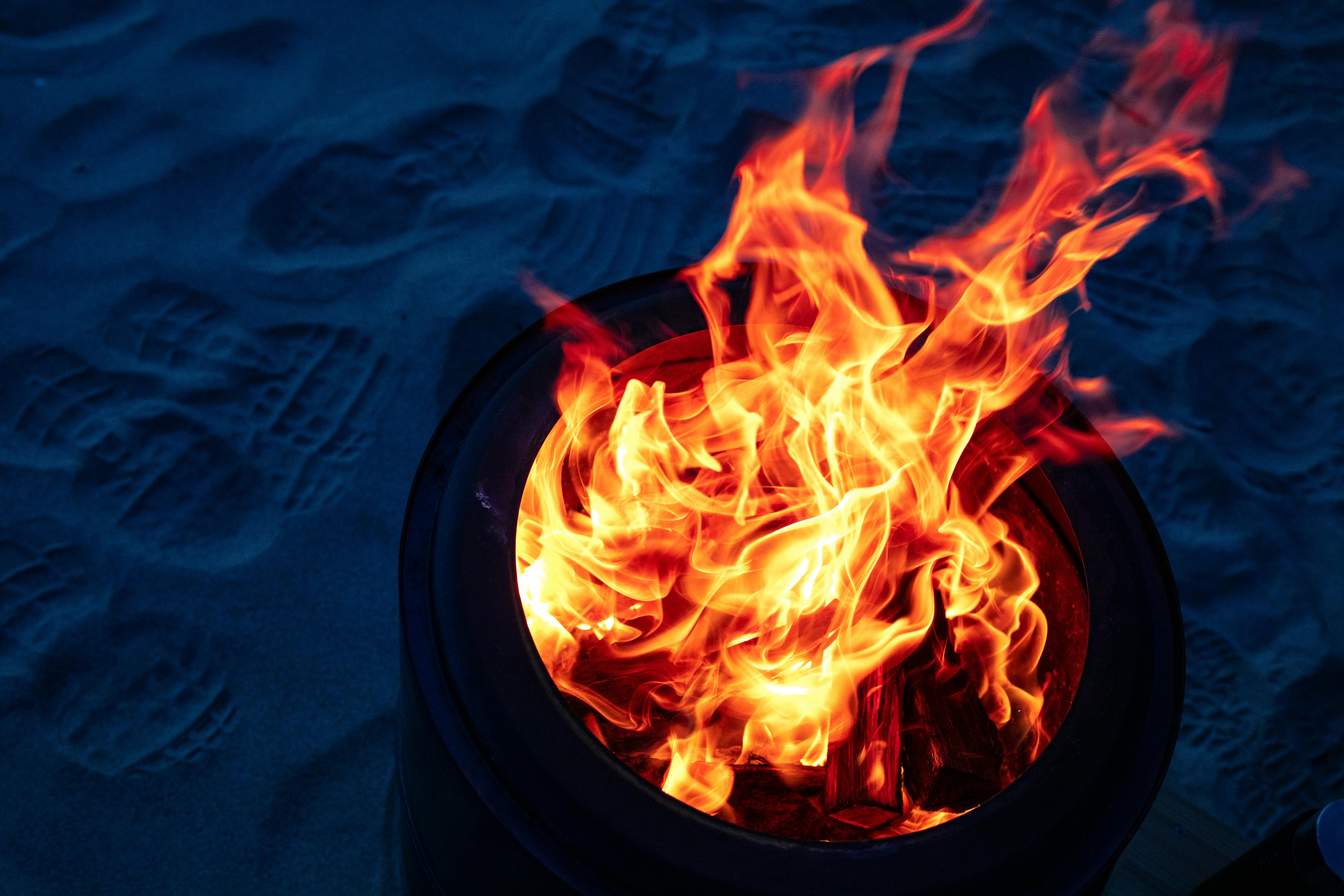 Bonfire in Barrel on Beach · Free Stock Photo