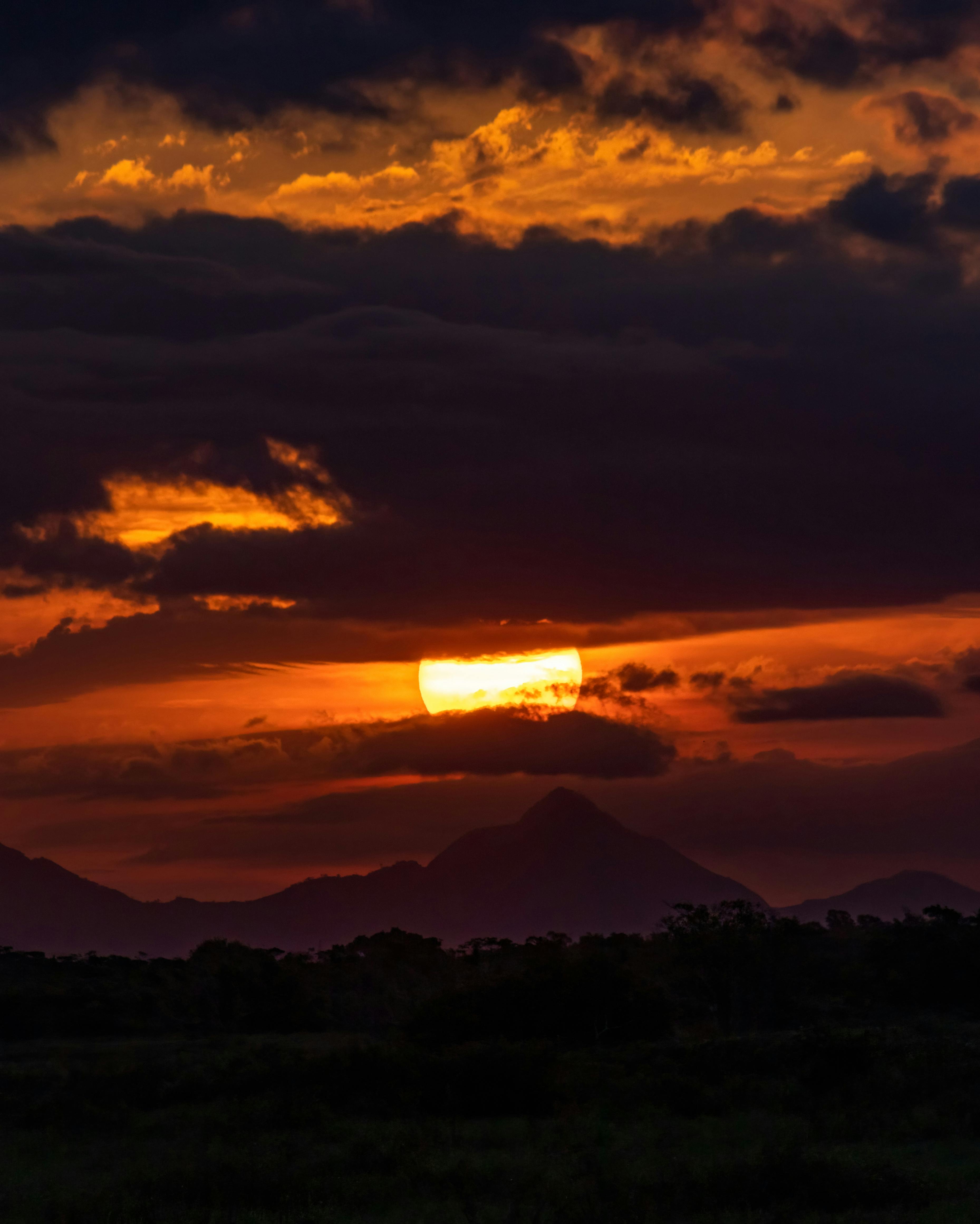 Sun Setting above the Mountains · Free Stock Photo