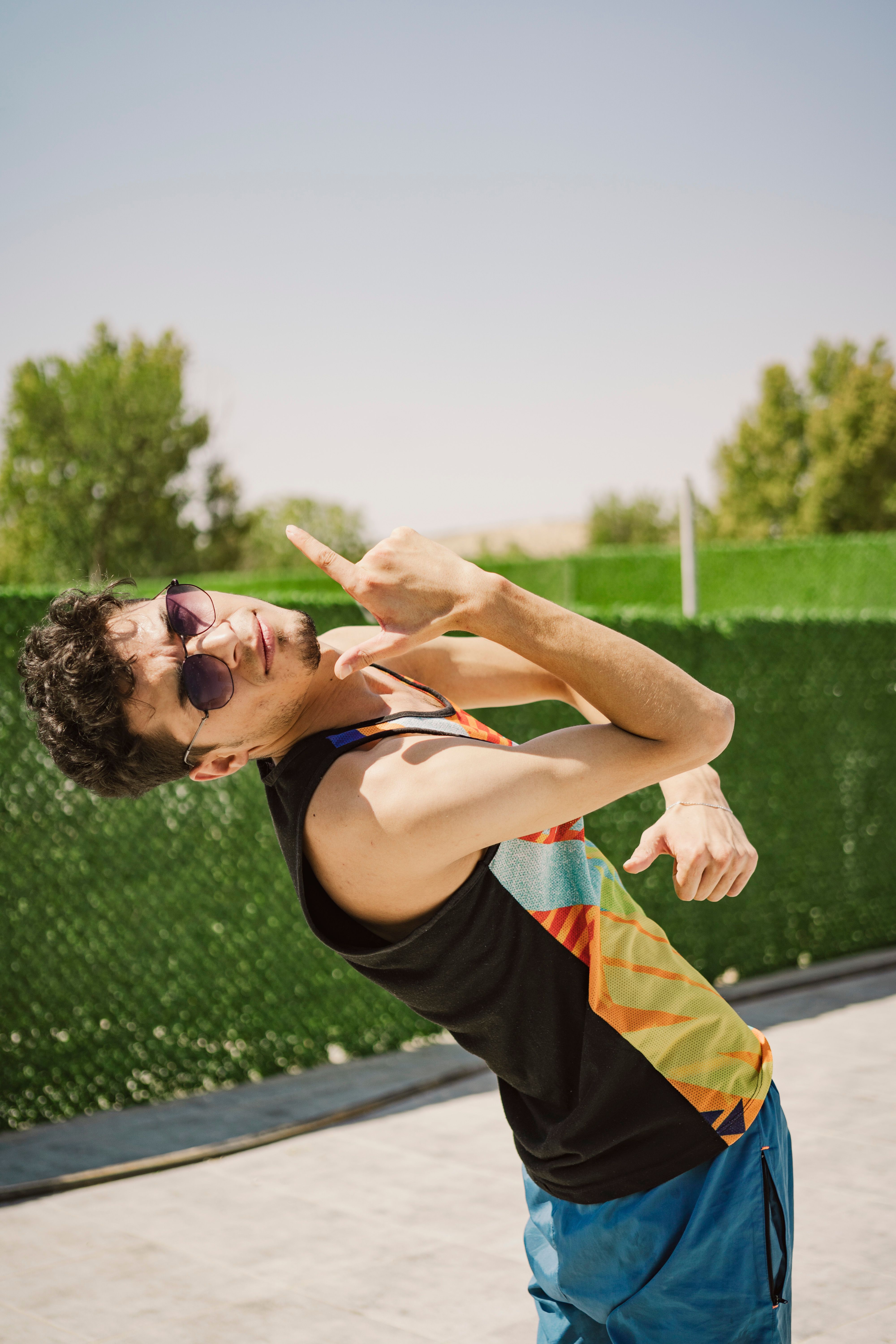 Funky Man with Headphones Making Hearing Gesture · Free Stock Photo