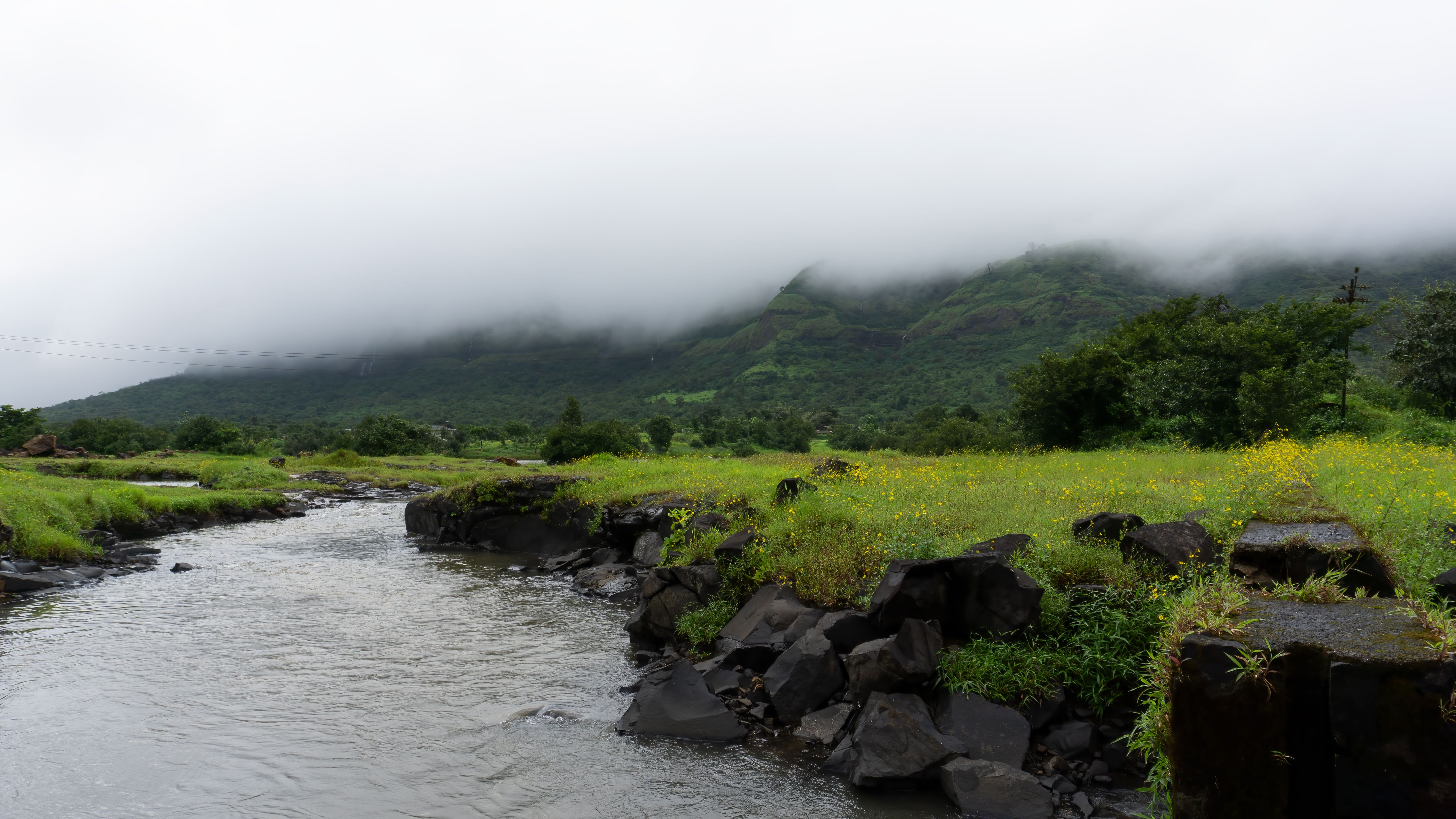 A Narrow River Between Mountains · Free Stock Photo