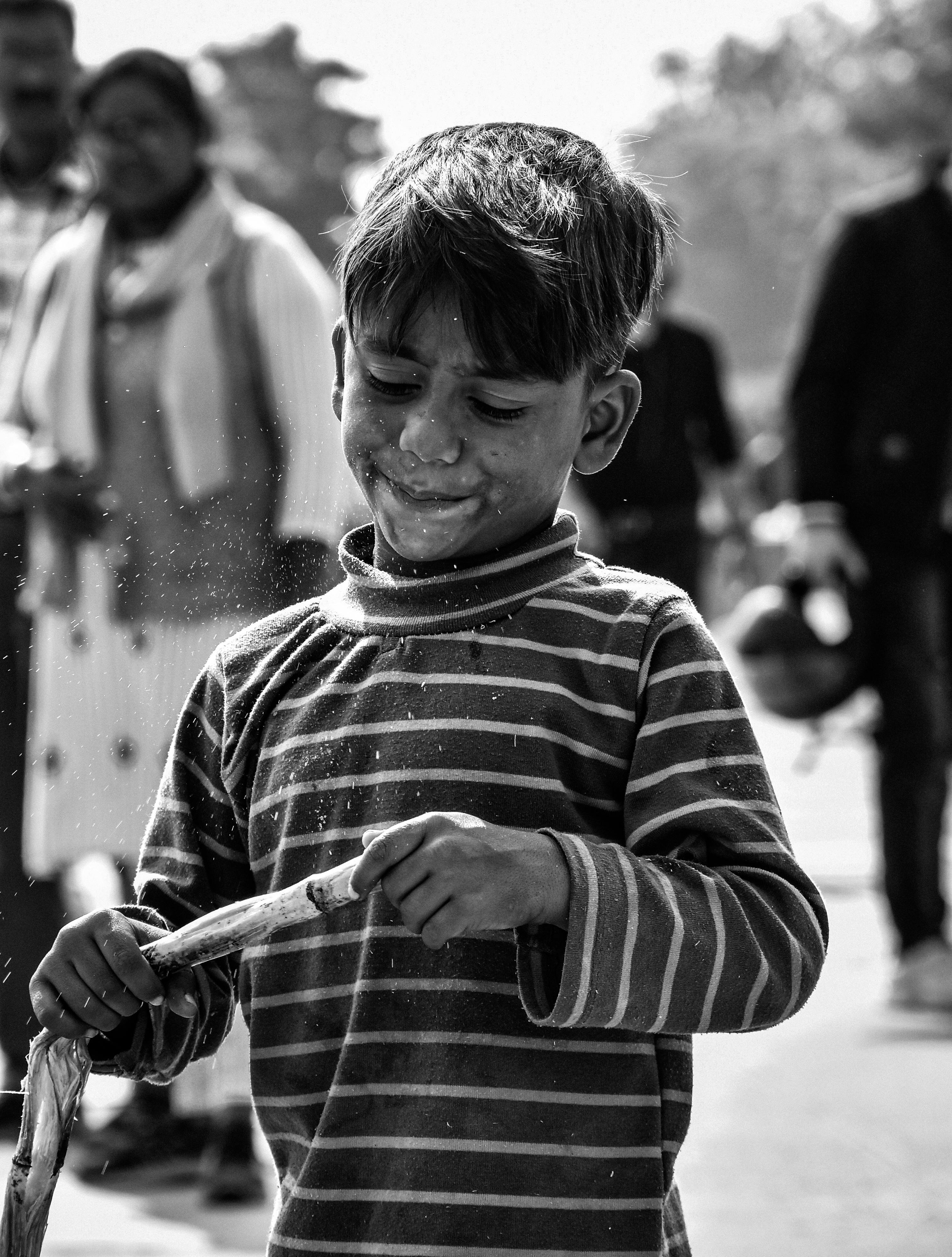 Joyful Child Playing with Powder in Jaipur · Free Stock Photo
