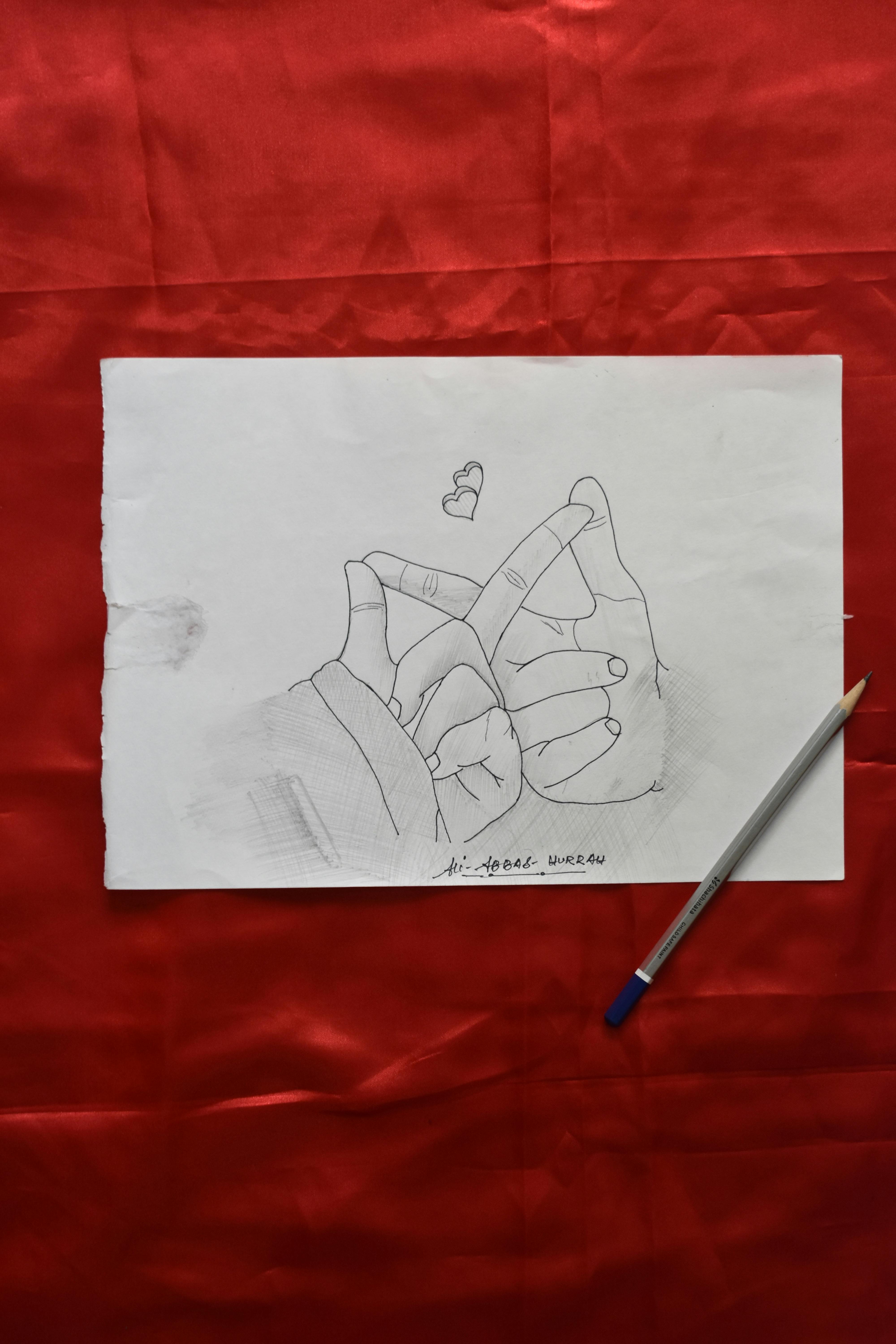 Pencil on Top of a Paper with Drawing · Free Stock Photo