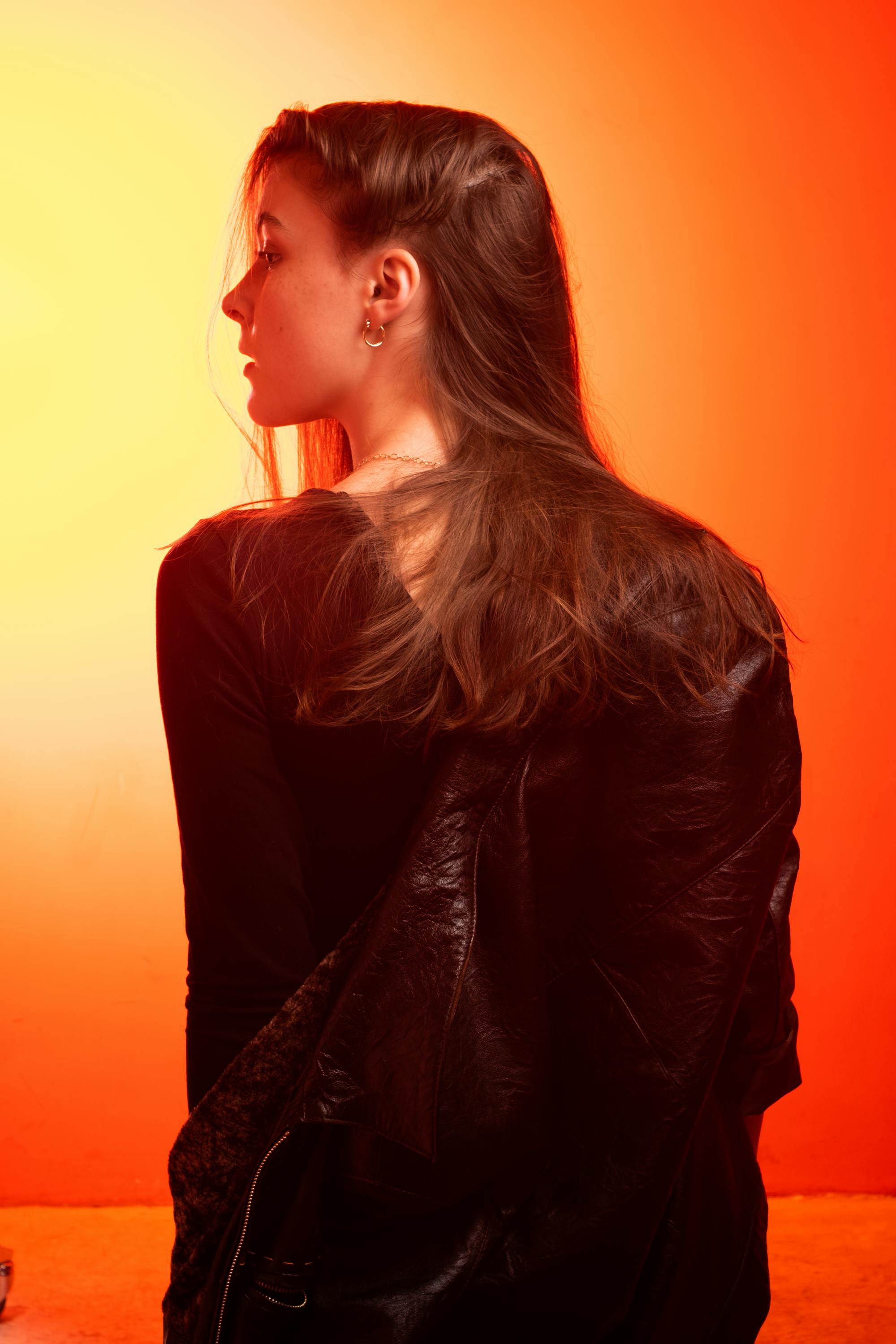 Back View of a Woman Wearing Black Dress · Free Stock Photo