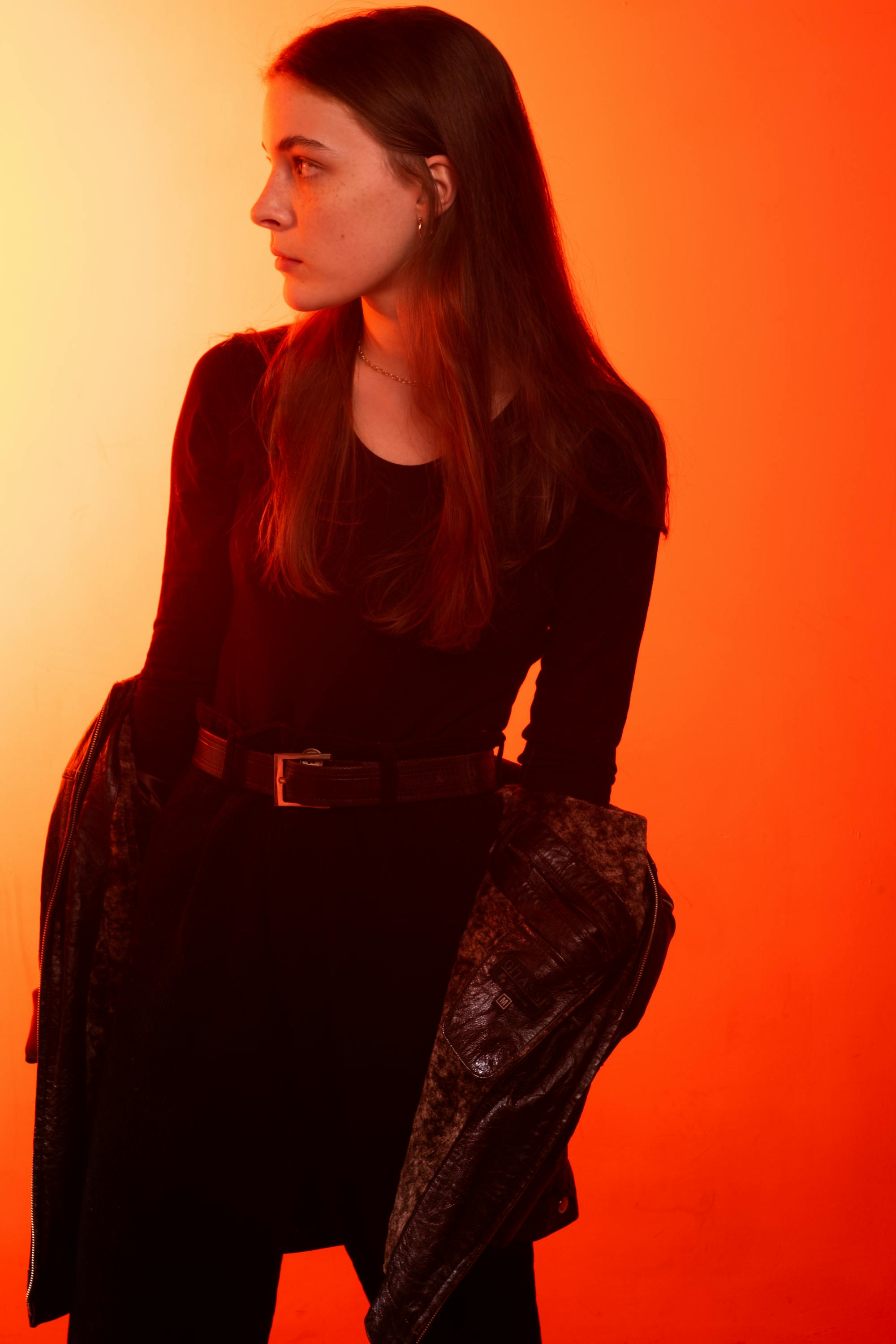 Woman Standing Next to Building · Free Stock Photo