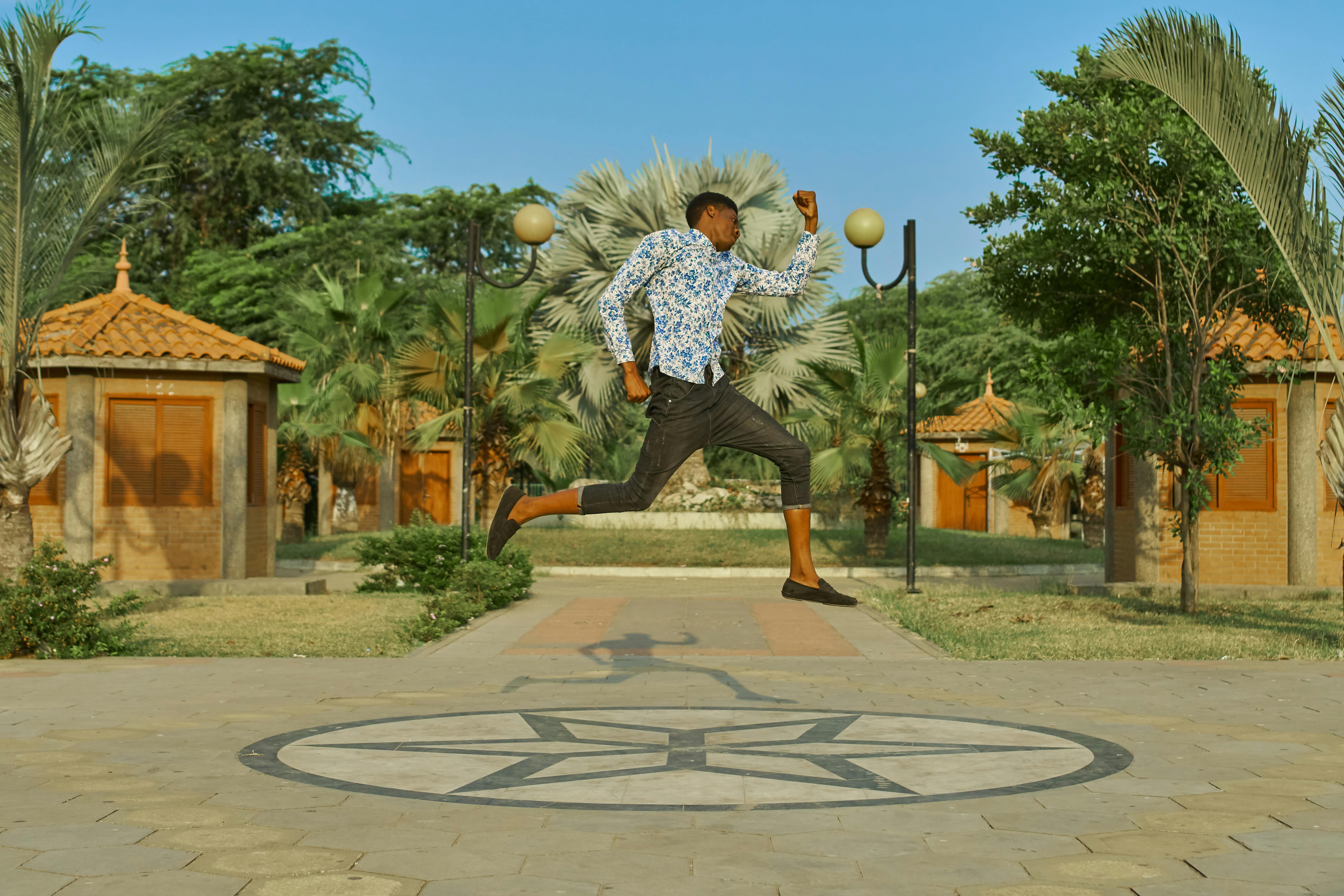 Photo Of A Man Jumping · Free Stock Photo