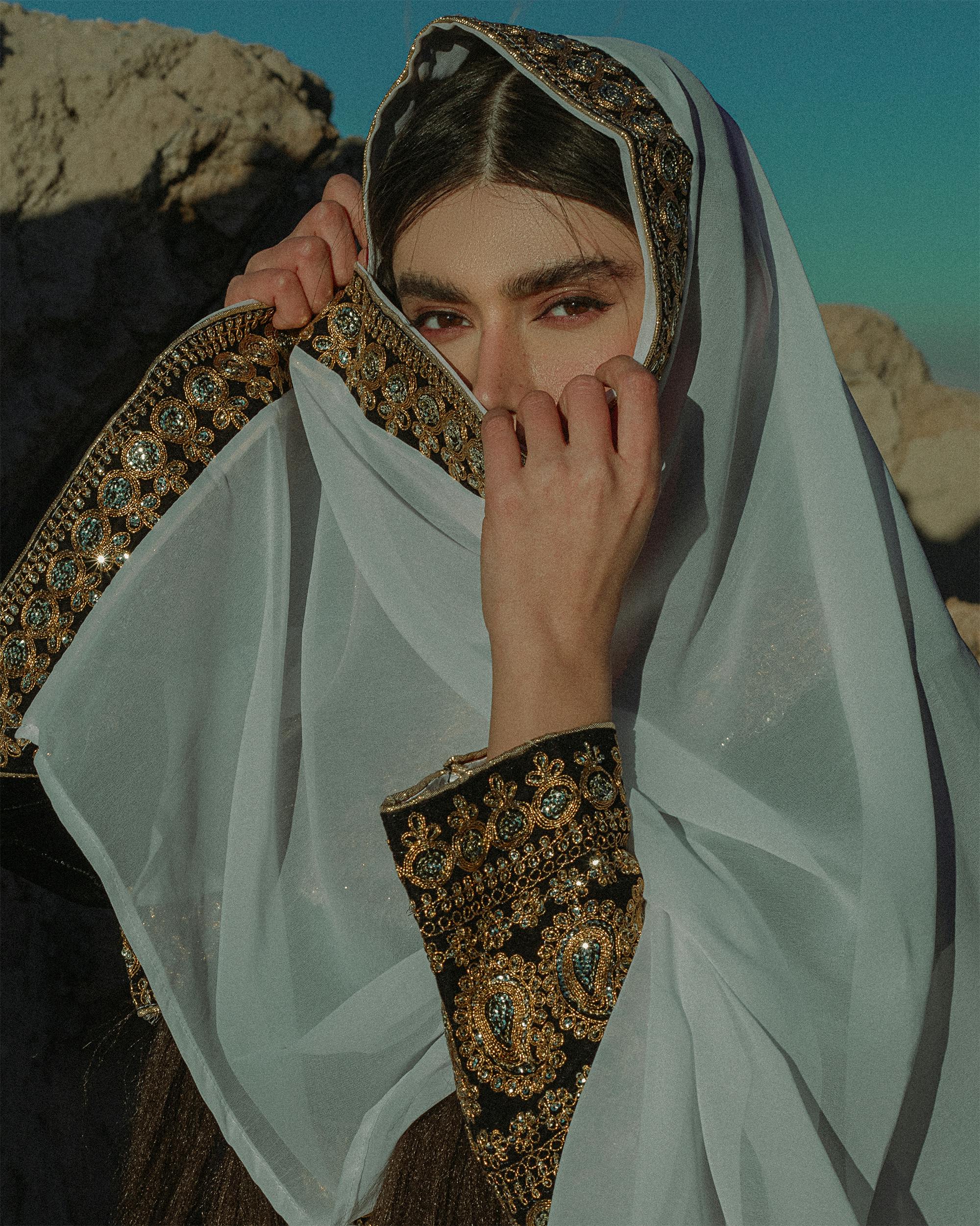 Portrait of a Woman Covering Her Face · Free Stock Photo