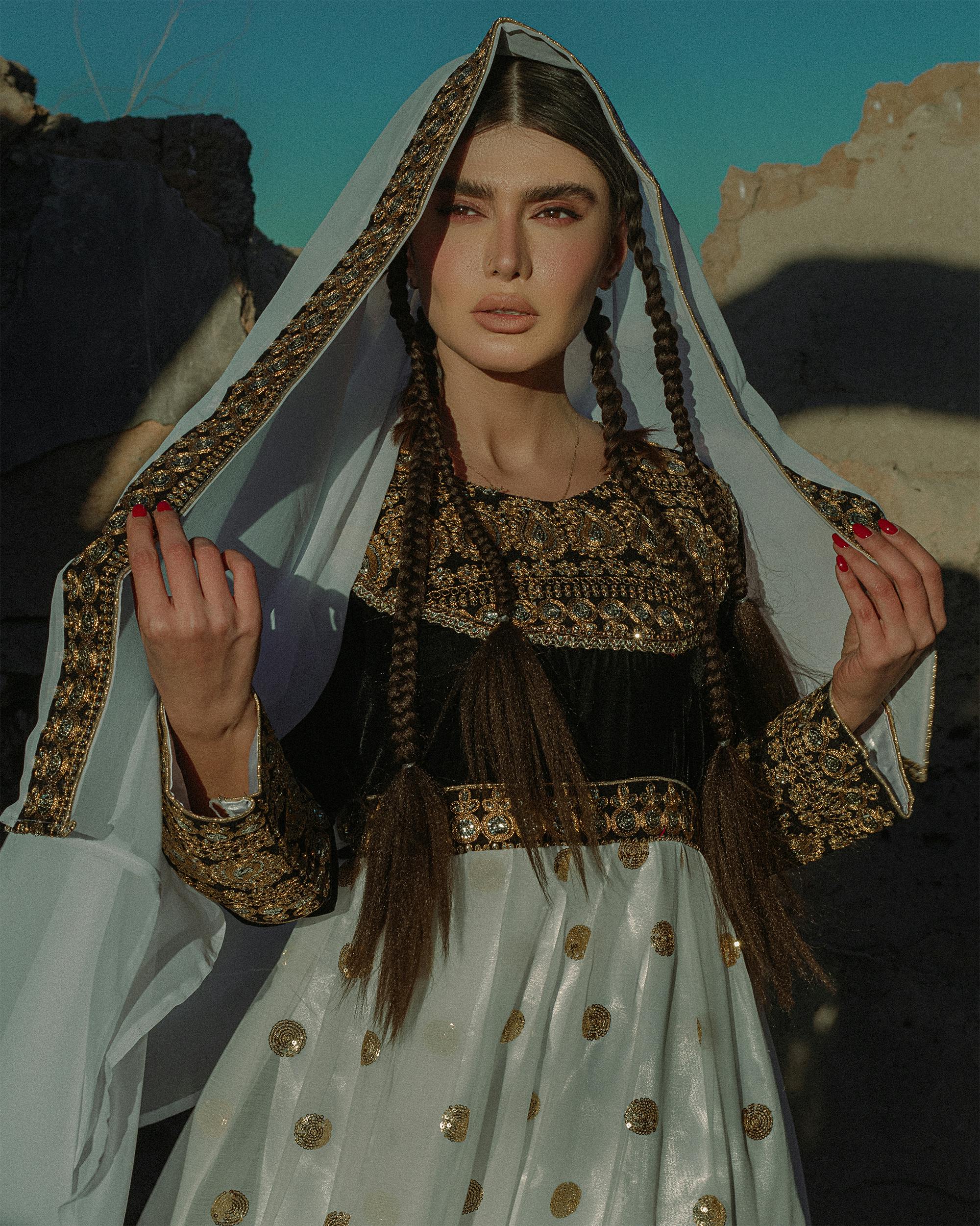 Portrait of a Beautiful Woman in Traditional Clothes · Free Stock Photo