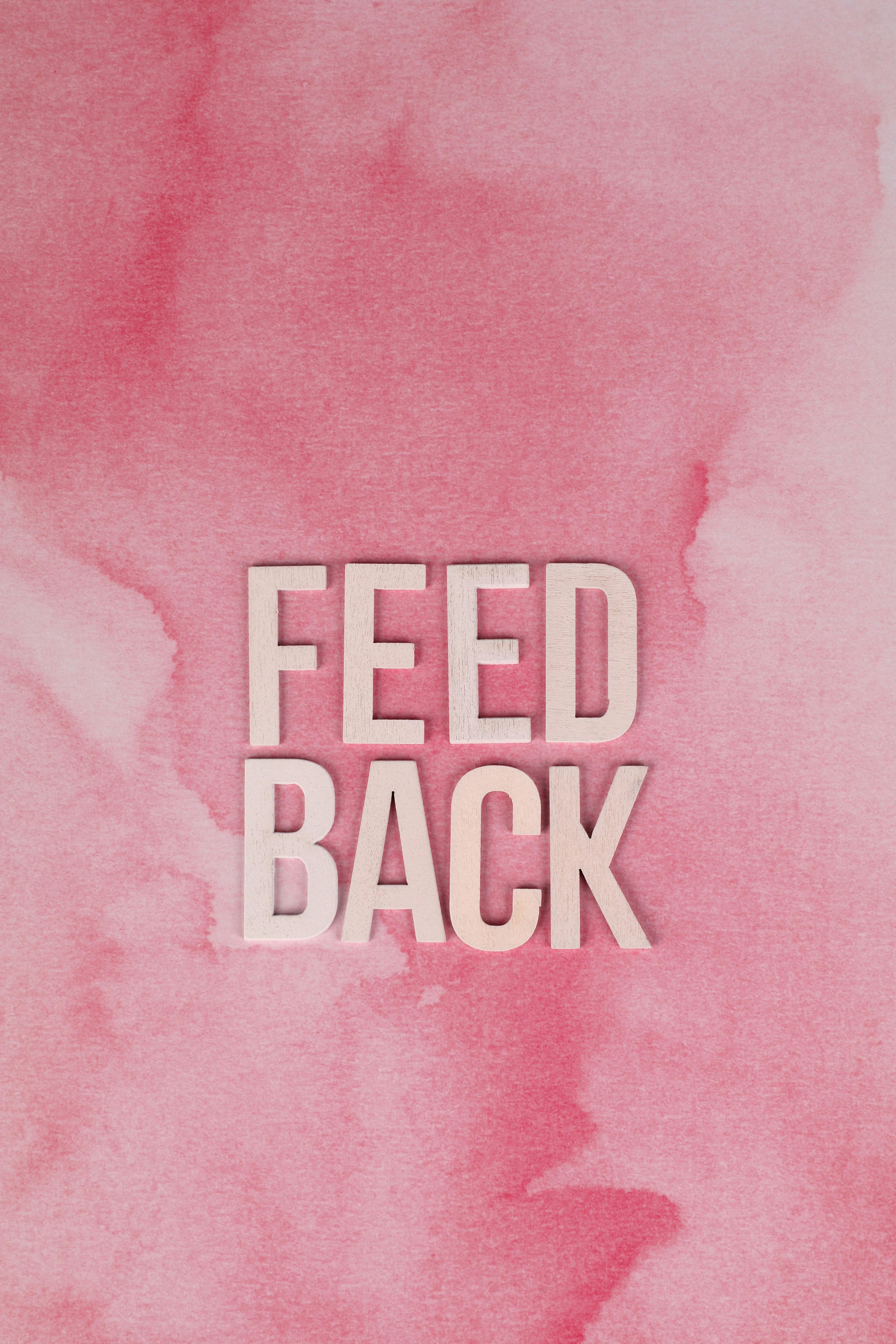 A Feedback Text with Pink Background · Free Stock Photo