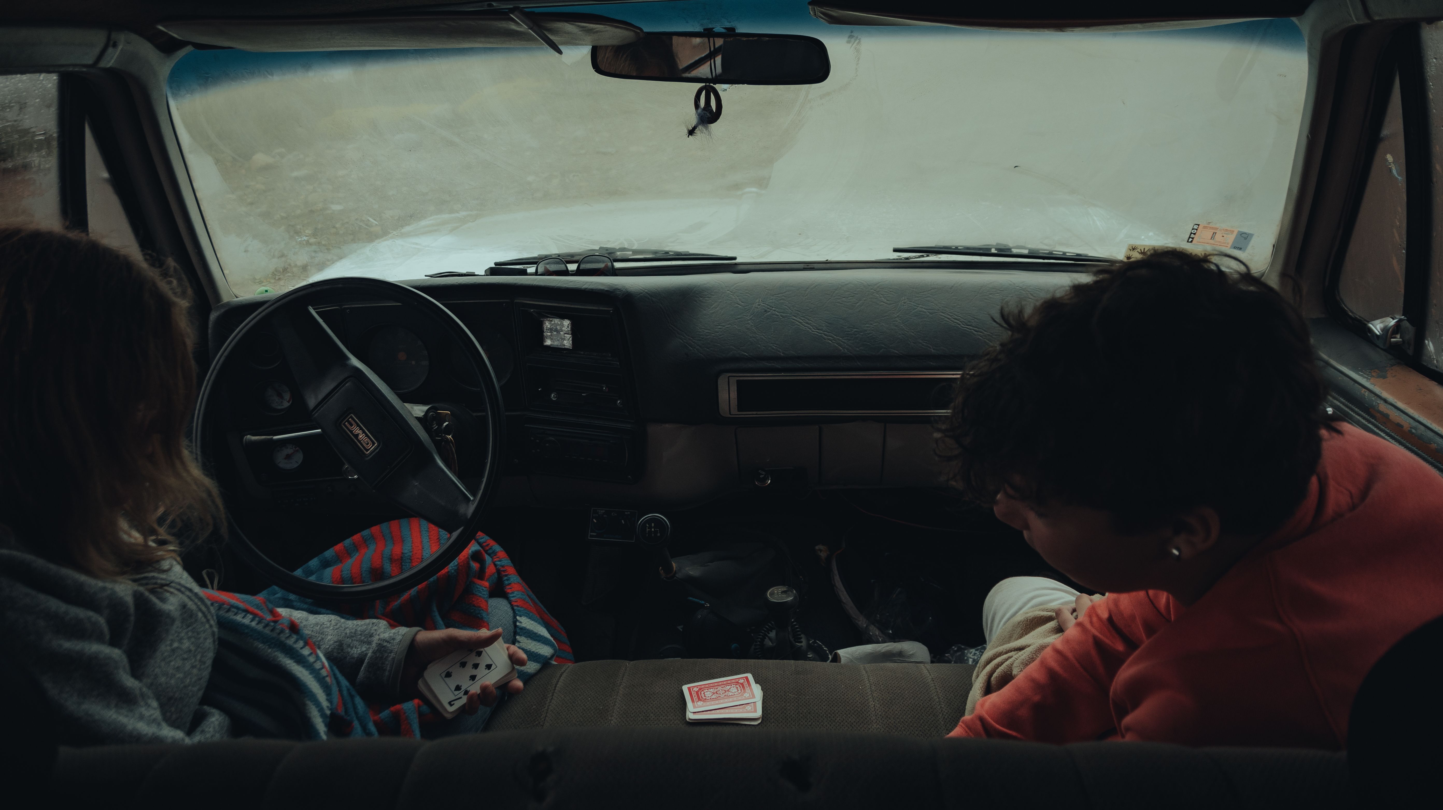 Black Classic Car Inside Well Lighted Room · Free Stock Photo