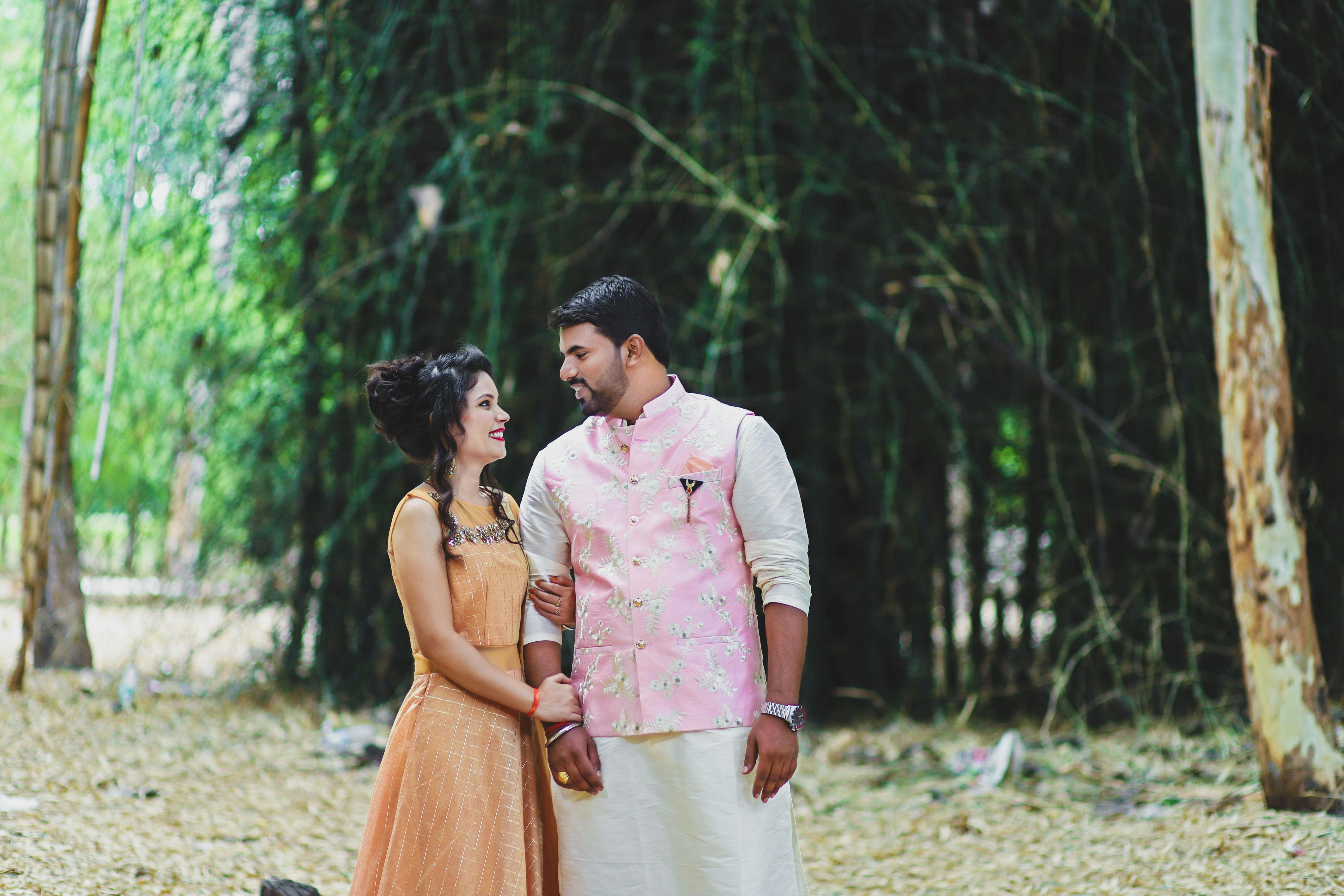 Romantic Couple in Traditional Clothing · Free Stock Photo