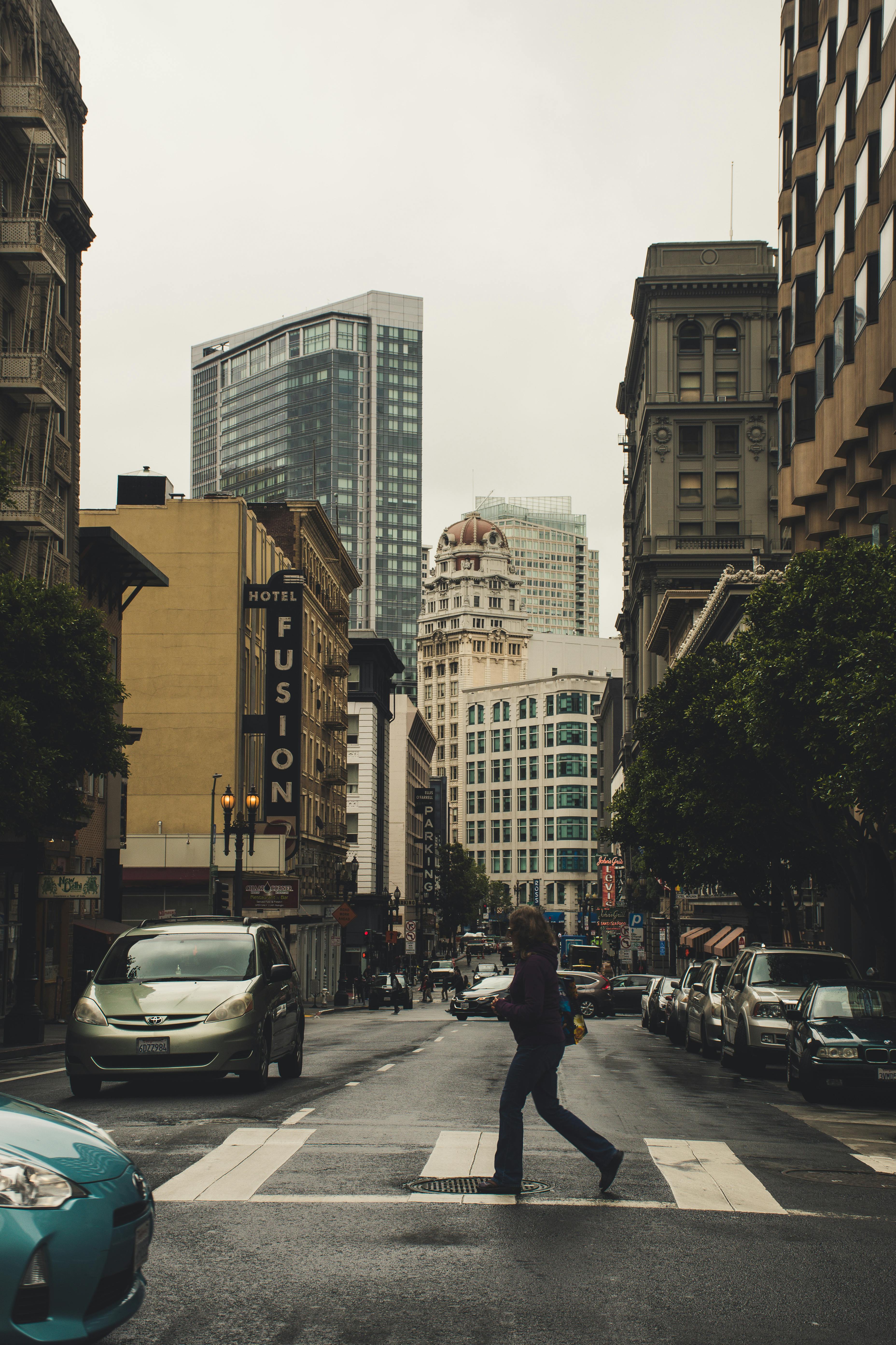 Woman Walking on Street Lines · Free Stock Photo