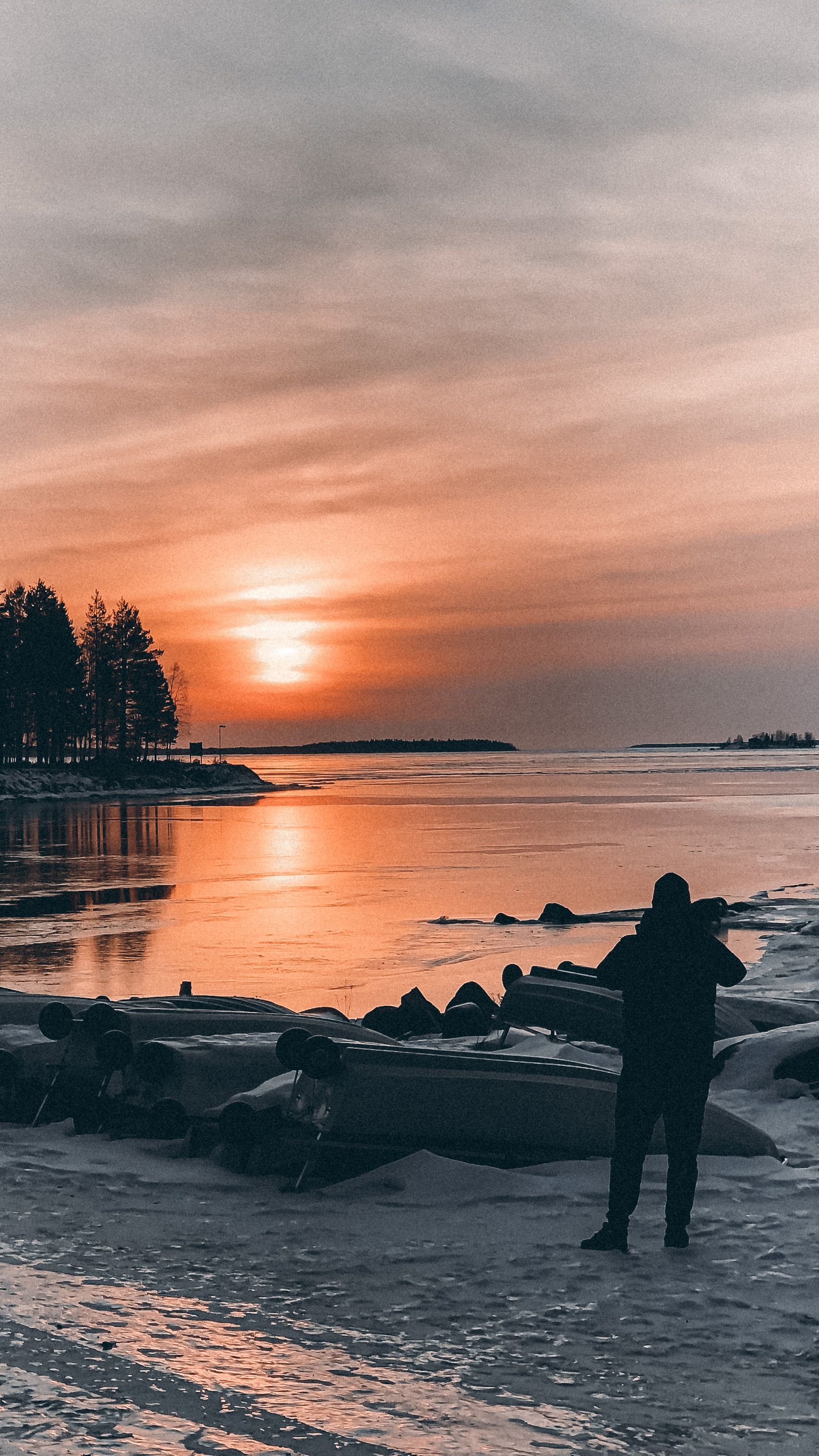 Man Standing on Lakeshore at Sunset · Free Stock Photo