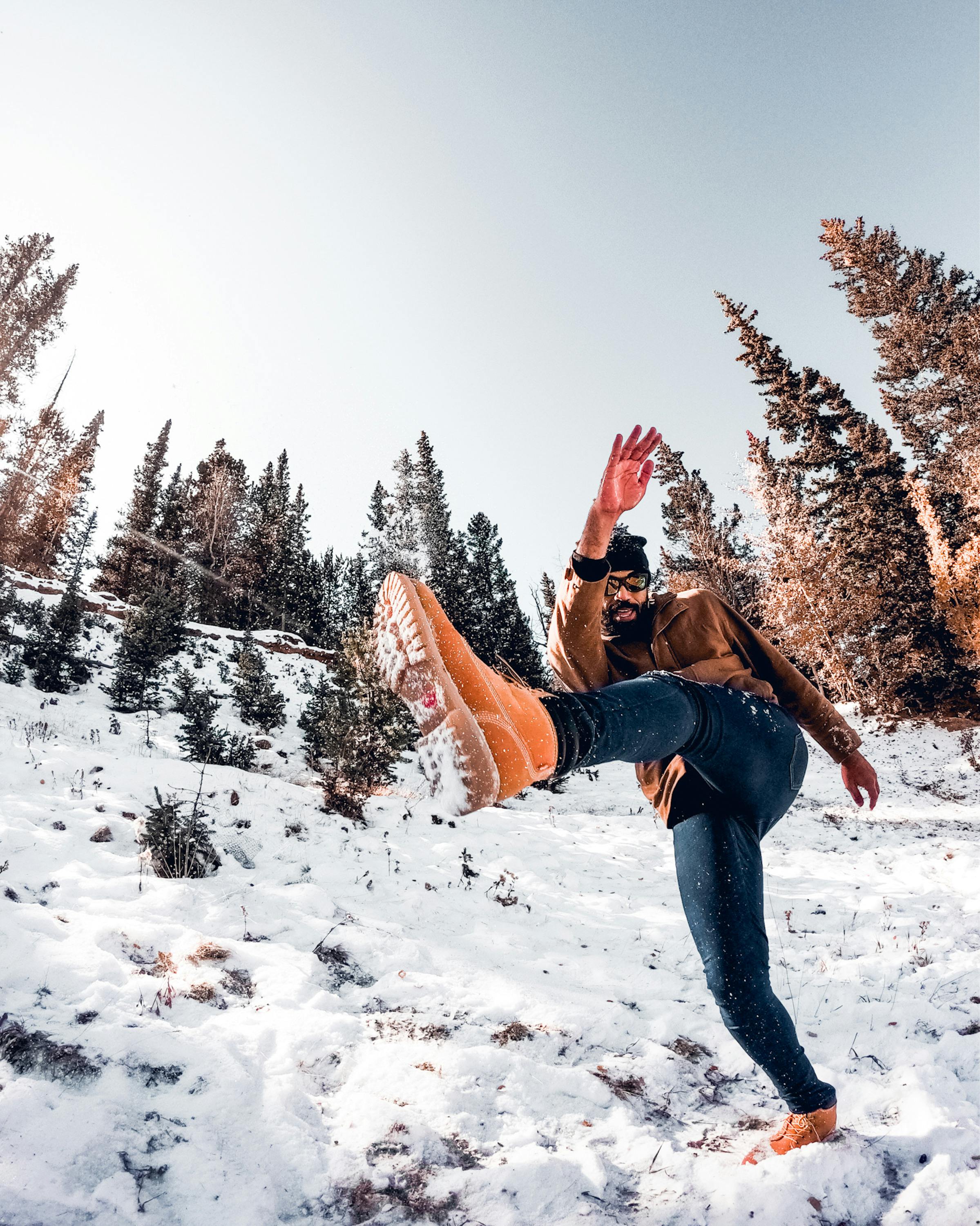 A Man Kicking Snow · Free Stock Photo