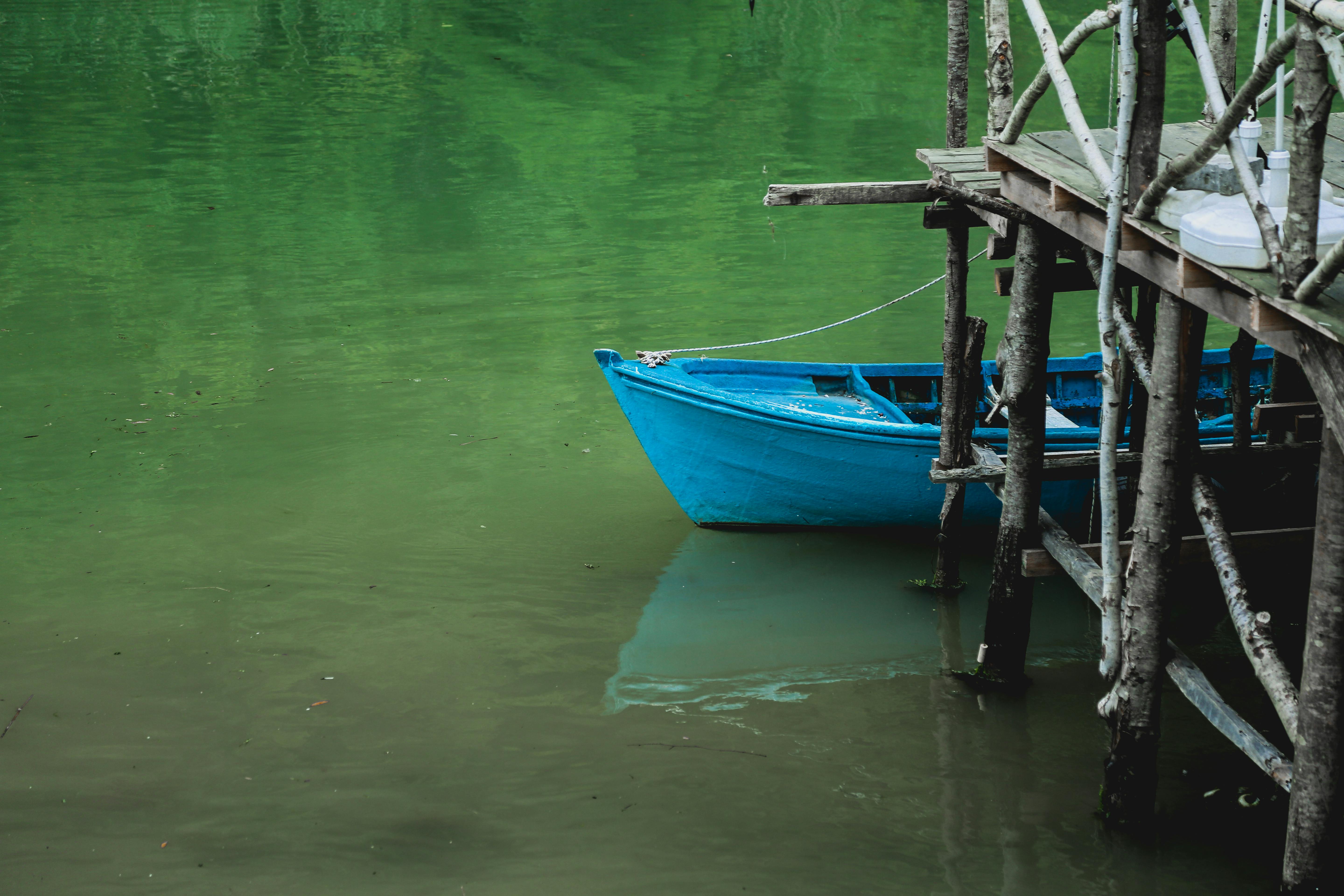 A Blue Boat on a Water · Free Stock Photo