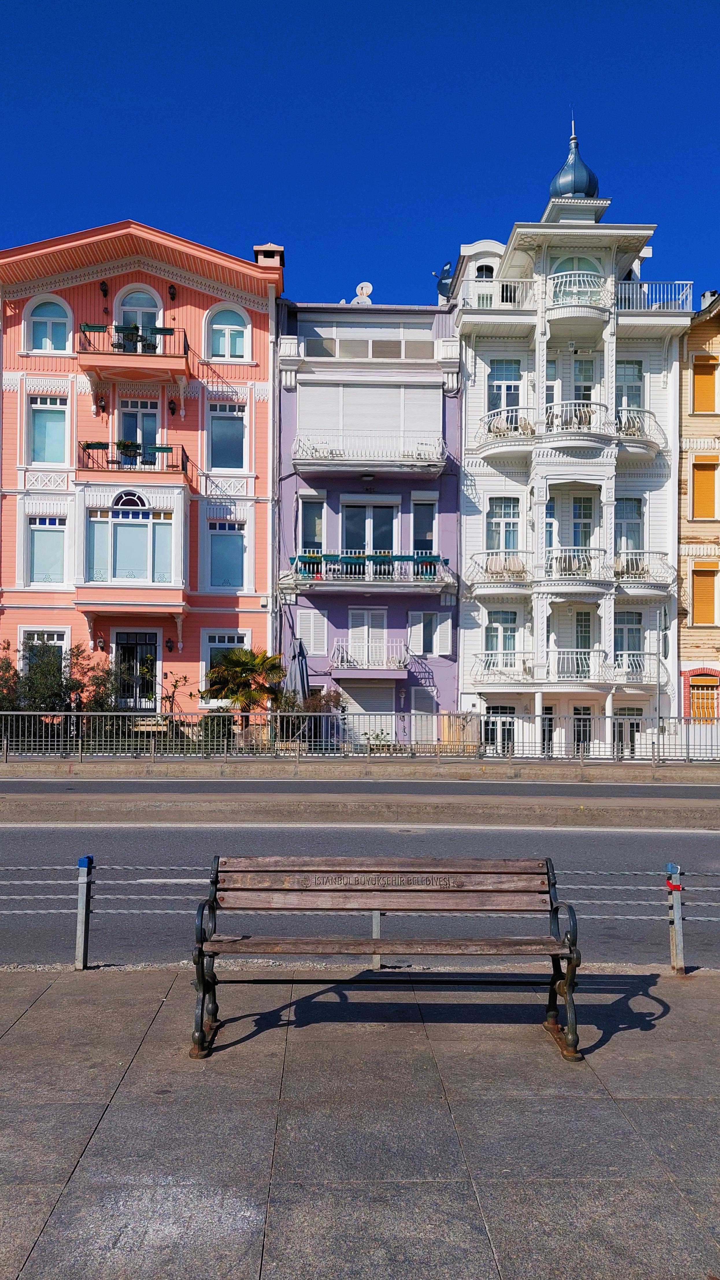 A Wooden Bench on a Sidewalk in Istanbul, Turkey · Free Stock Photo