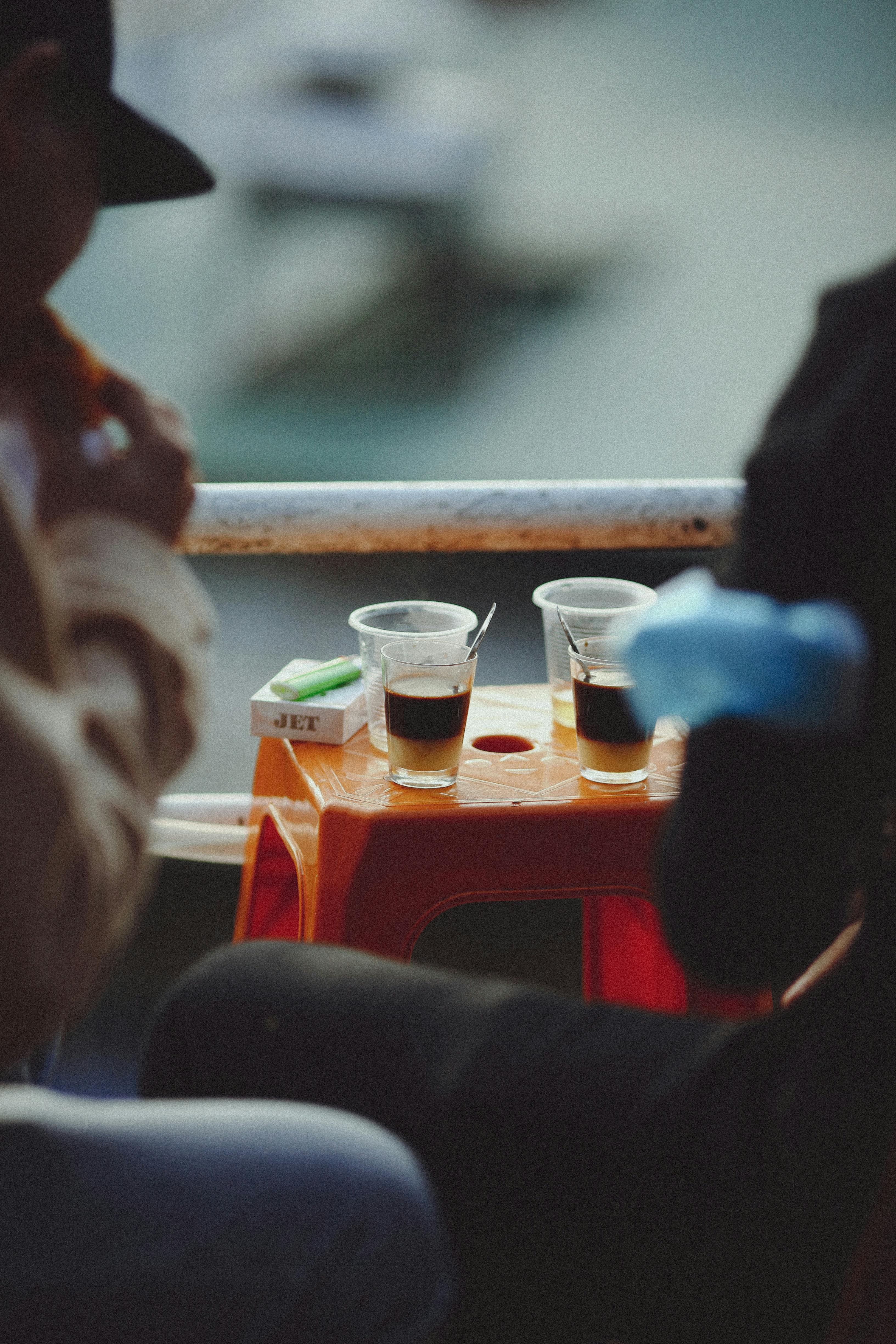 People and Coffee on Stool on Street · Free Stock Photo