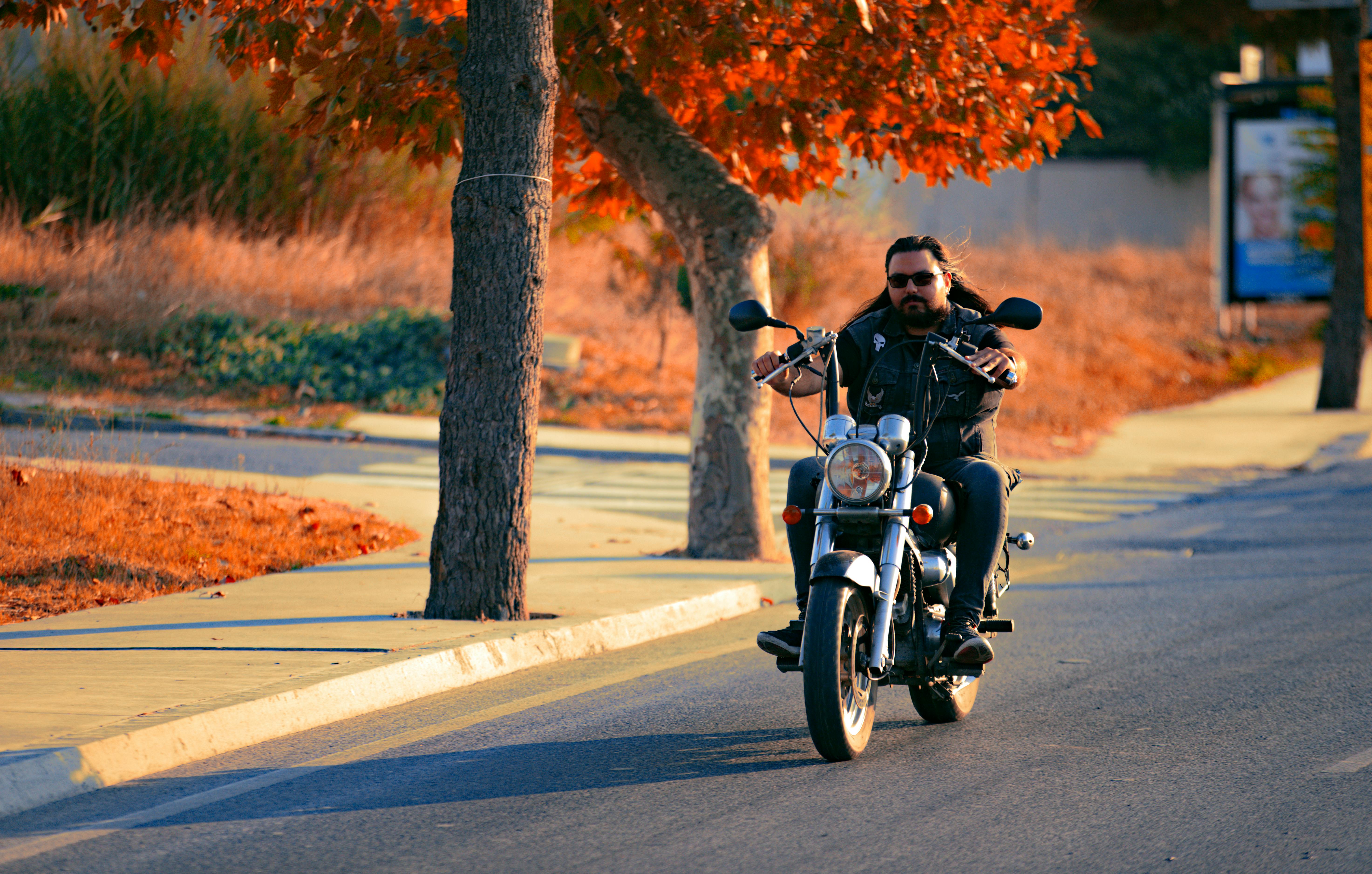 Man Riding a Motorcycle · Free Stock Photo