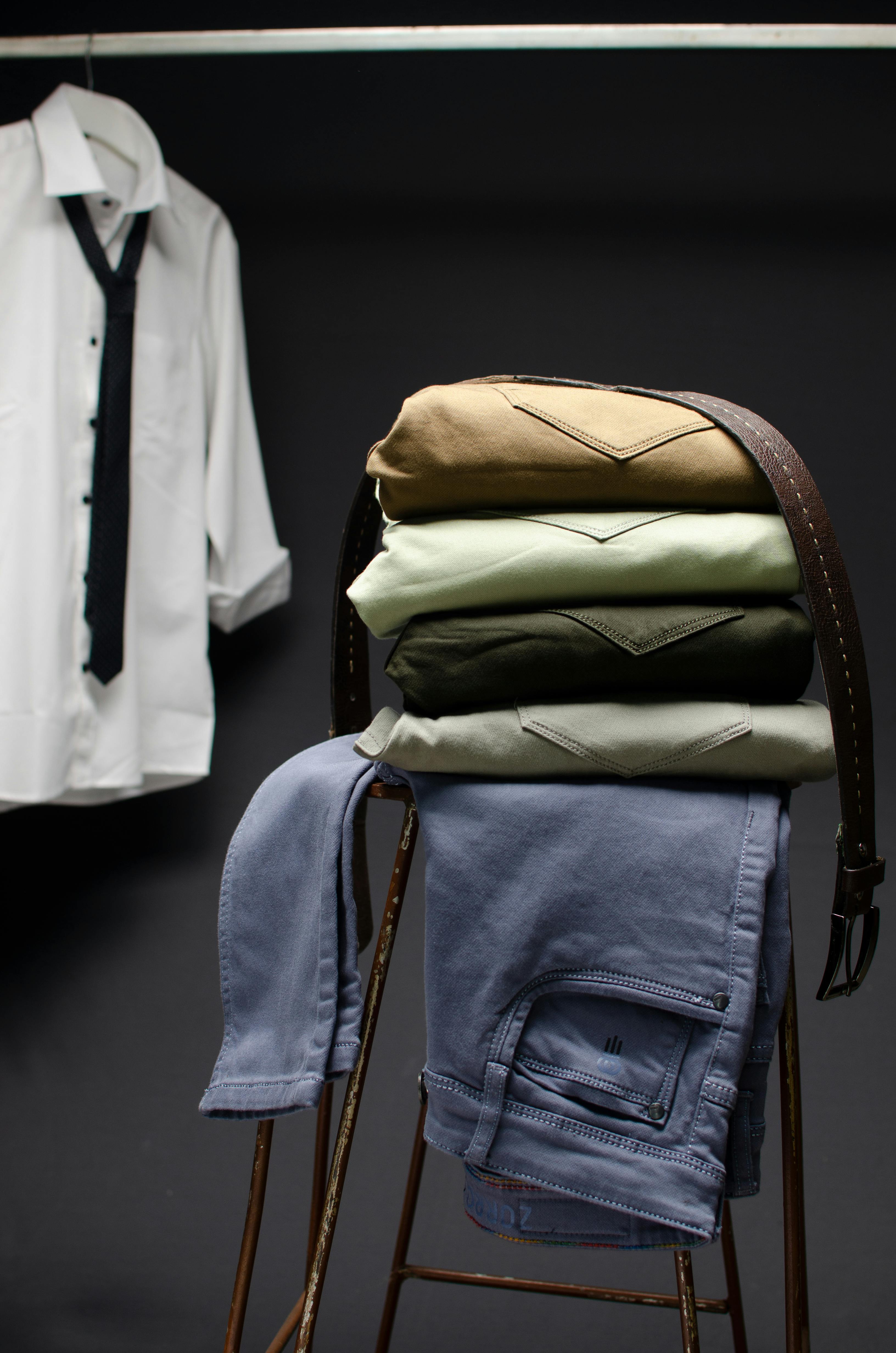 A Stack of Pants on a Bar Stool · Free Stock Photo