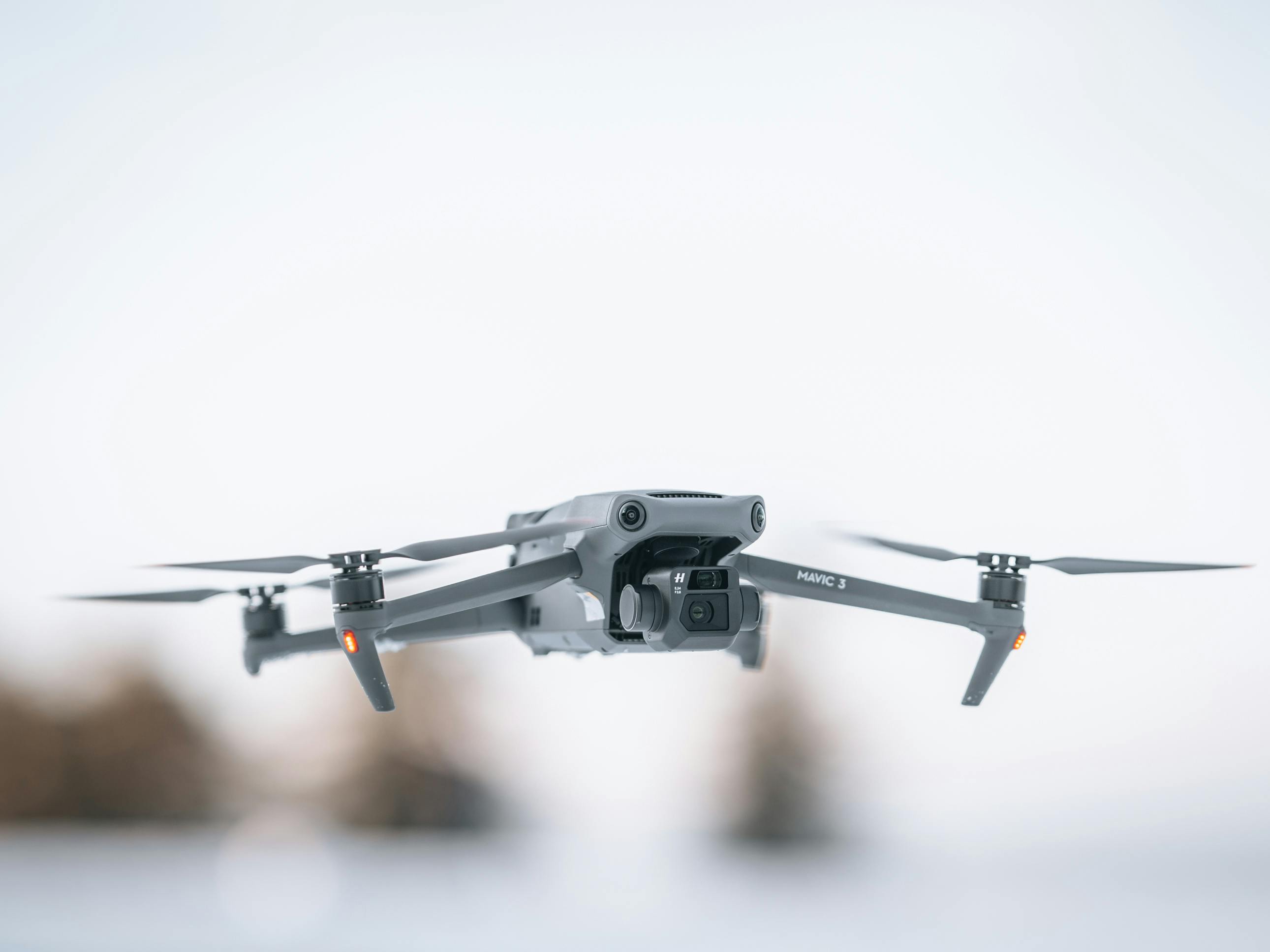 Flying White Drone · Free Stock Photo