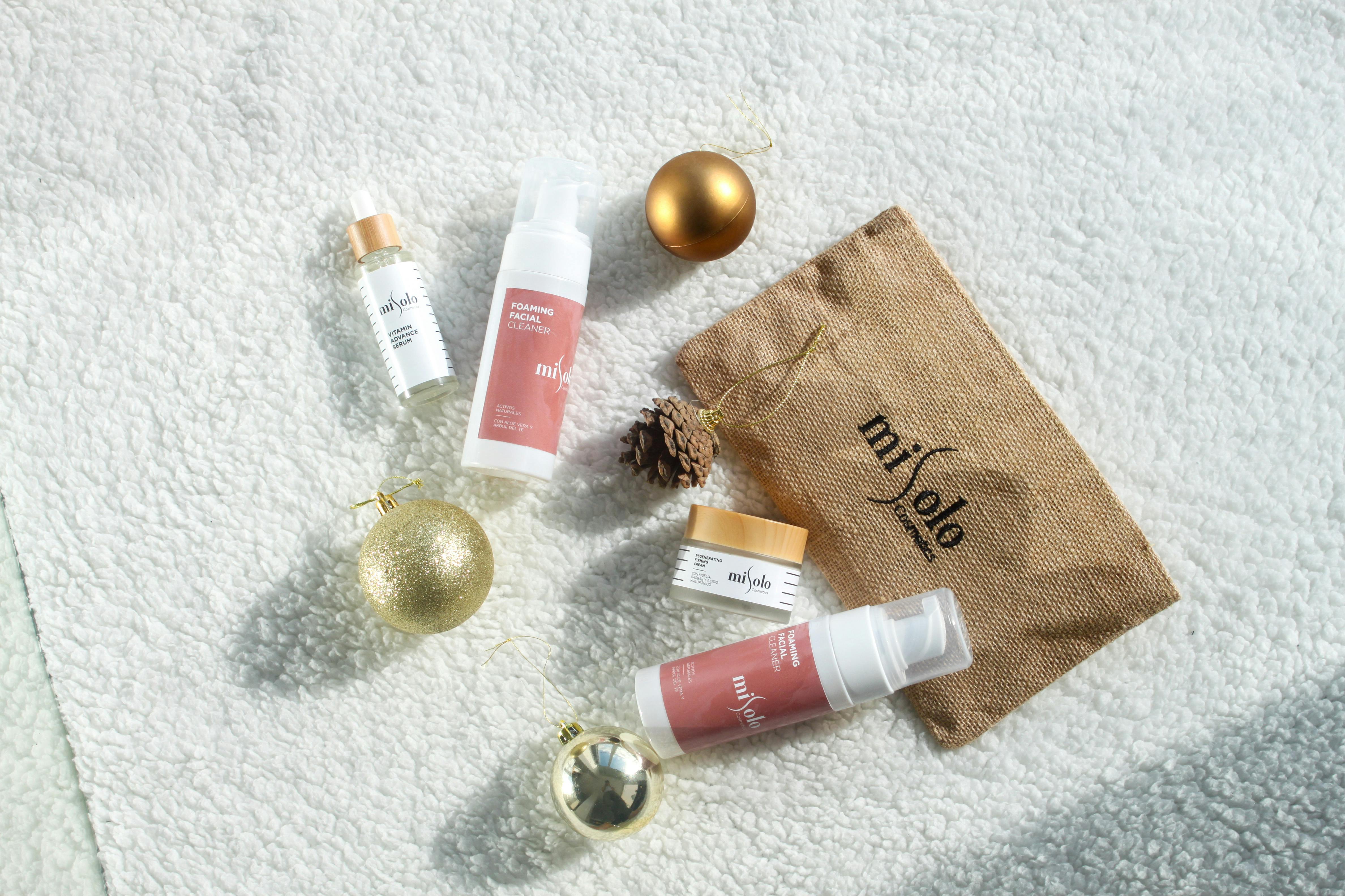 Cosmetic Products on Pastel Surface · Free Stock Photo