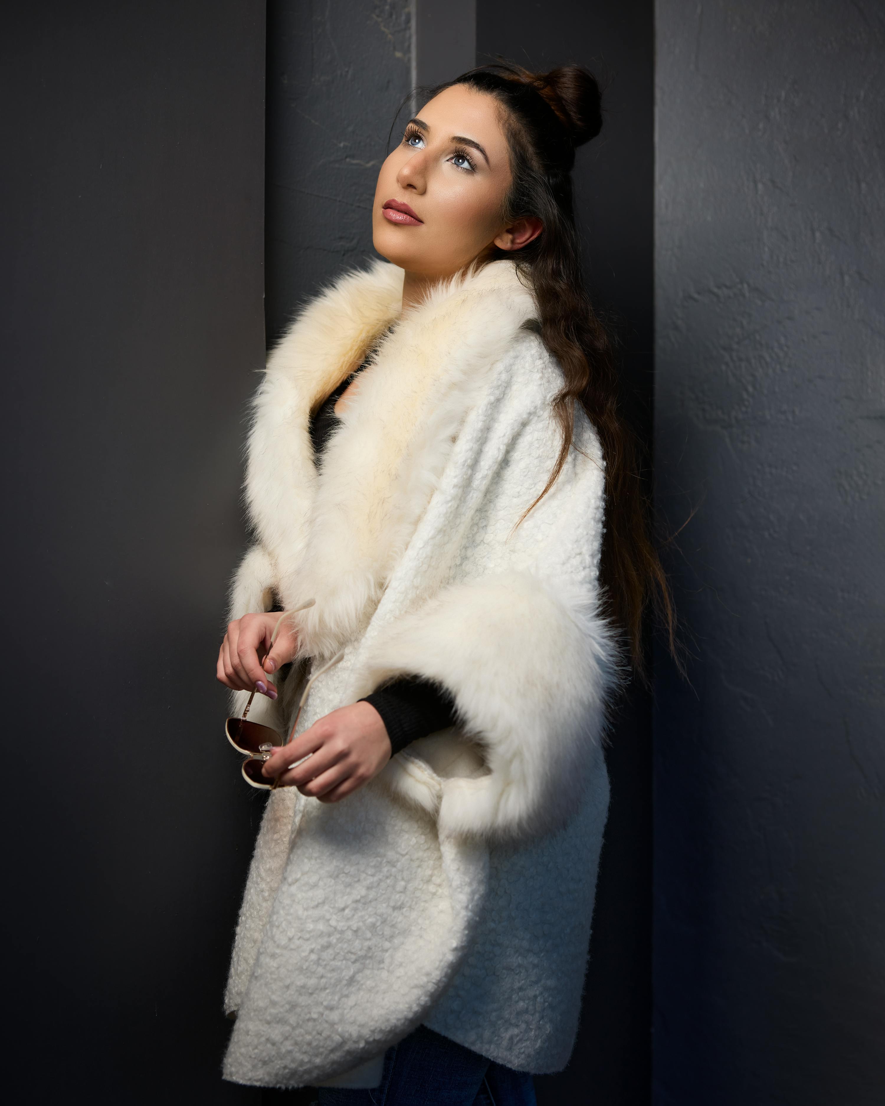A Pretty Woman in Pink Fur Coat · Free Stock Photo