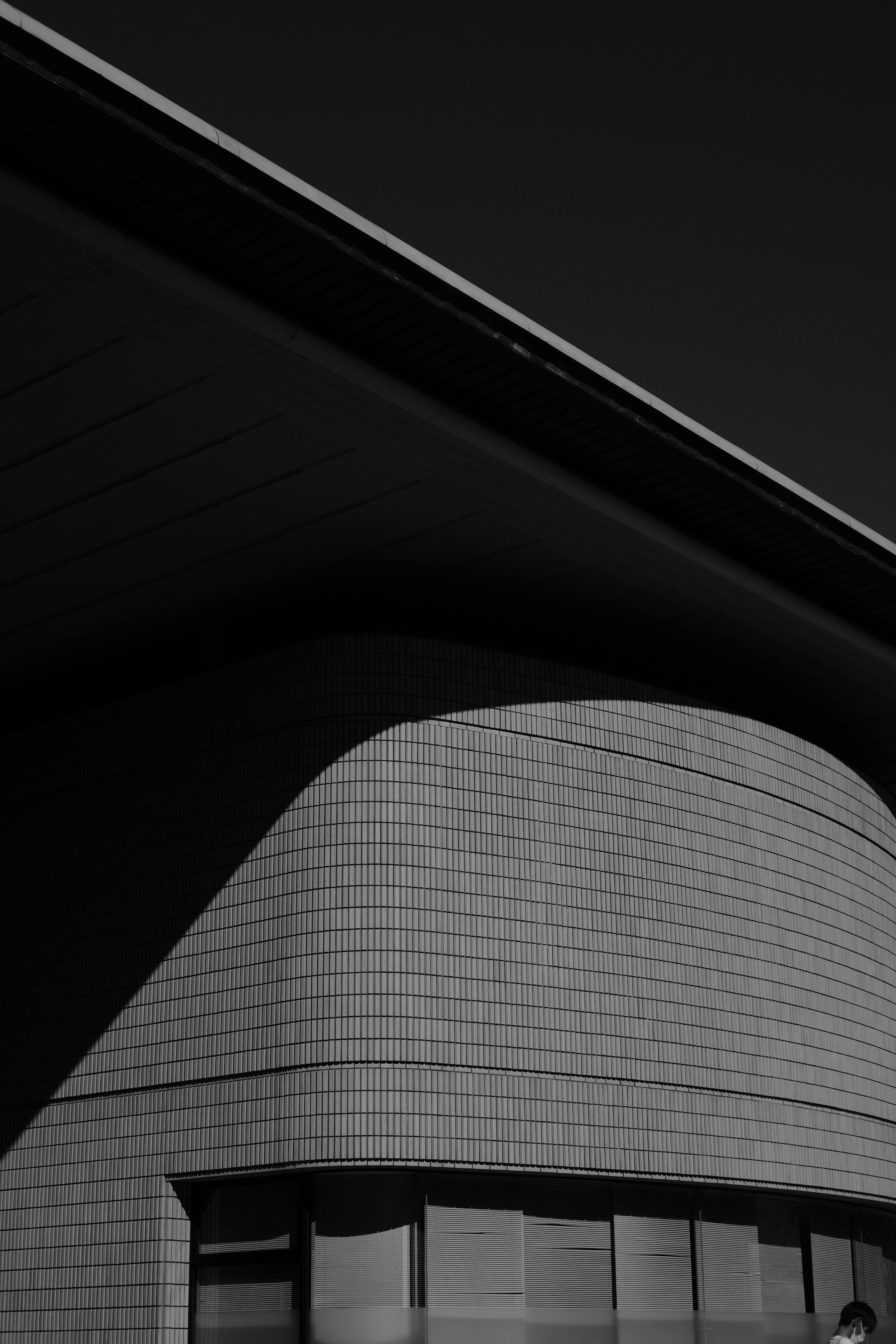 Grayscale Photo of Concrete Building · Free Stock Photo