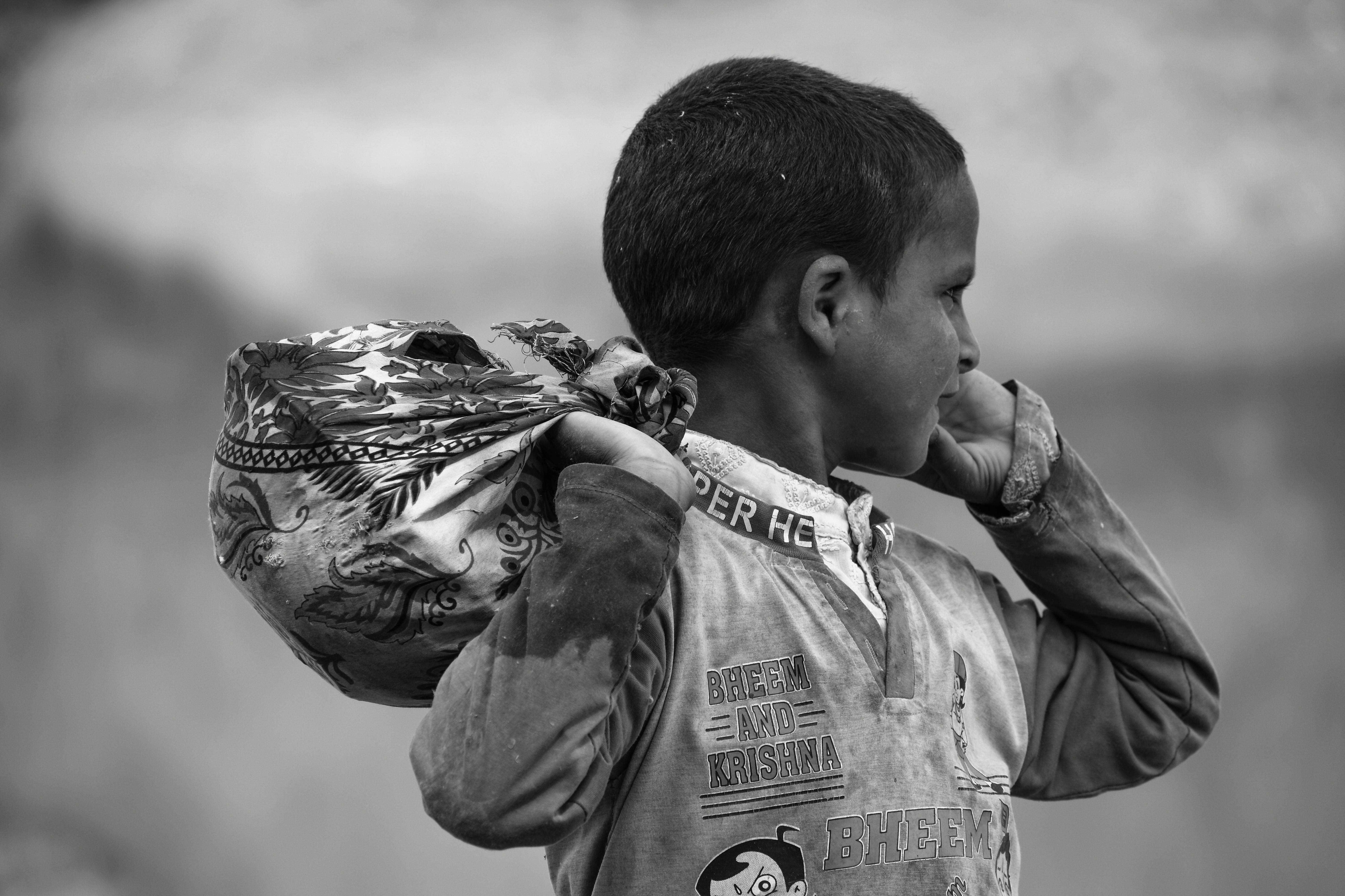 Boy Carrying Bag · Free Stock Photo