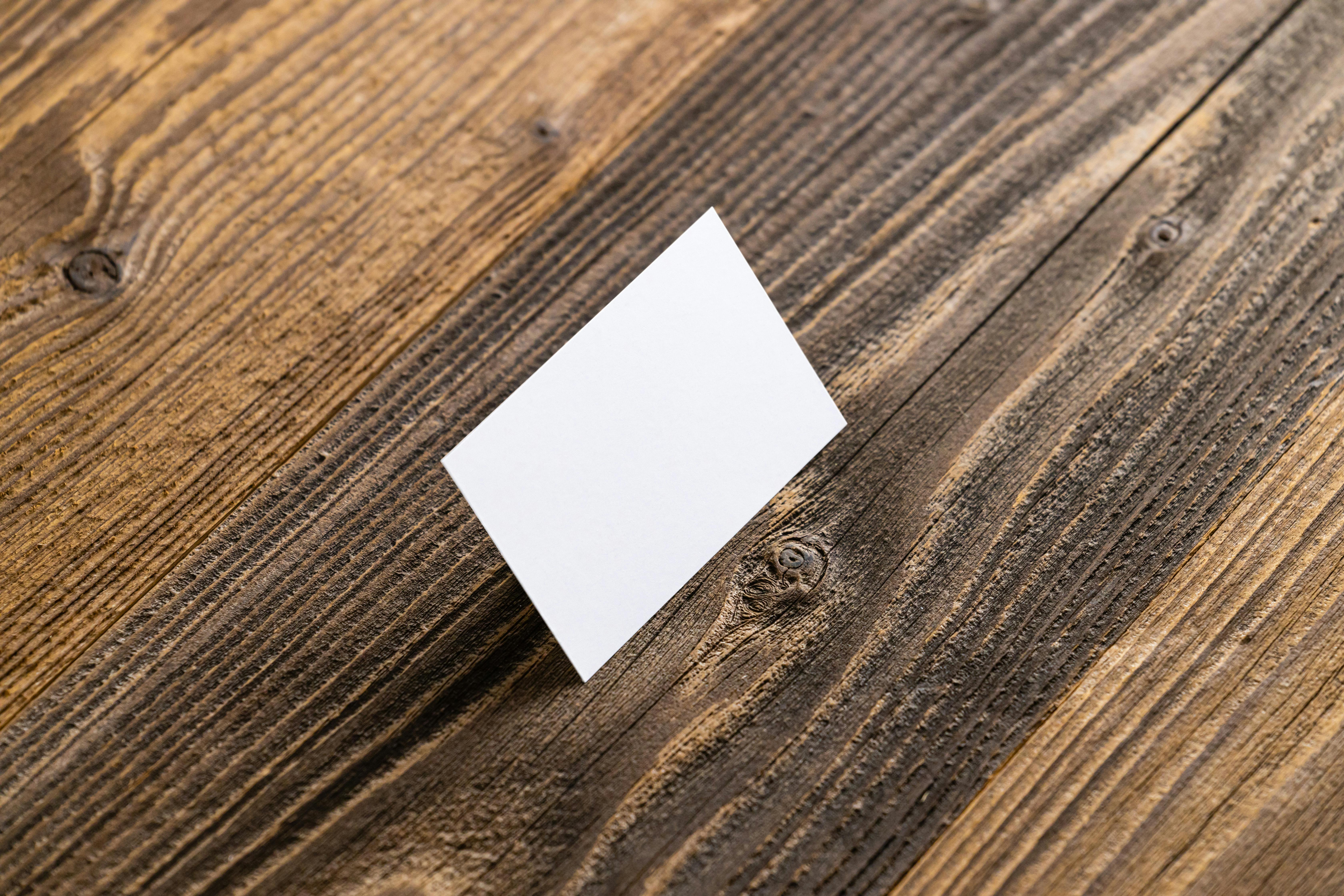 Close Up Shot of a White Card · Free Stock Photo
