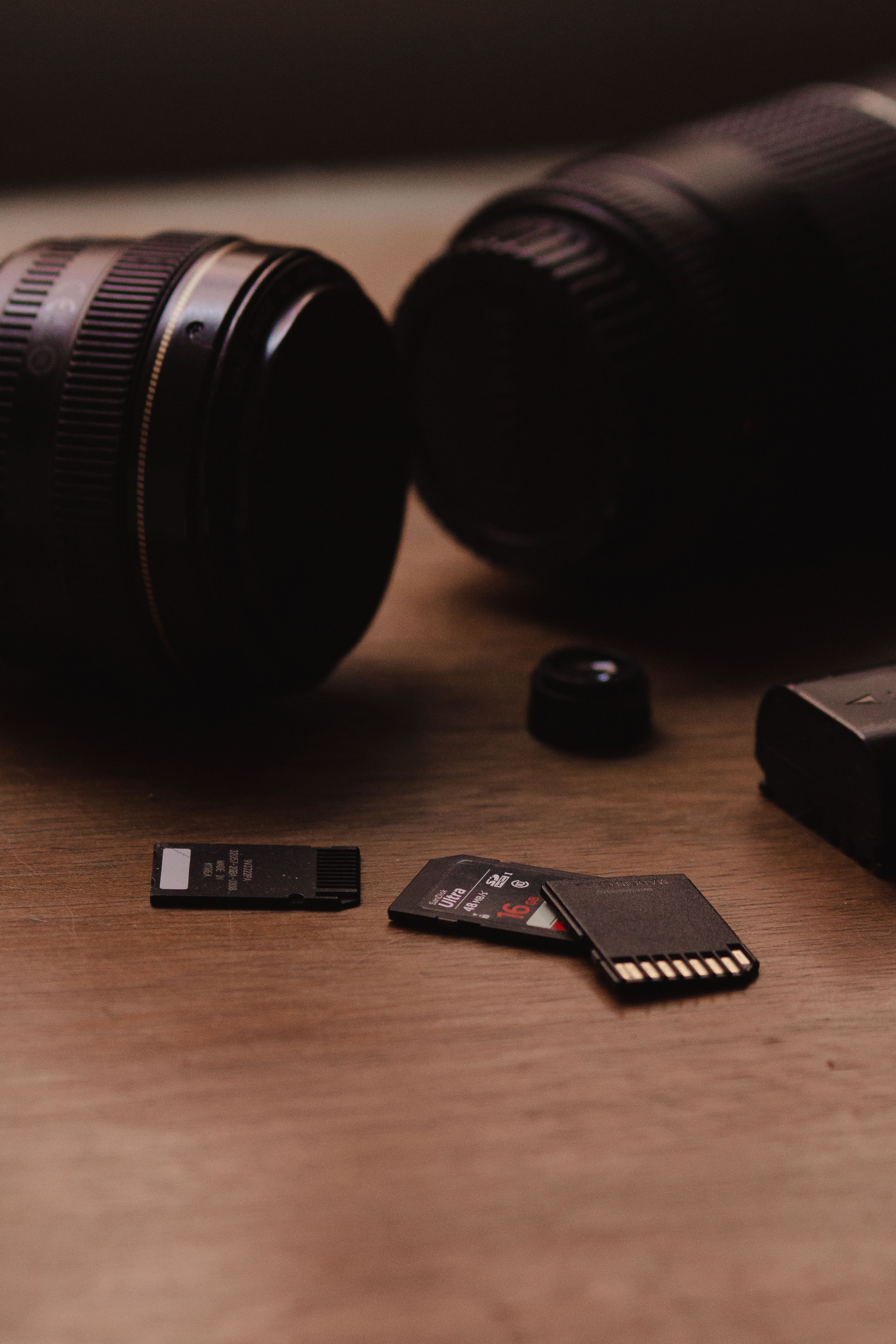 Black Sd Card Adapter on White Device · Free Stock Photo