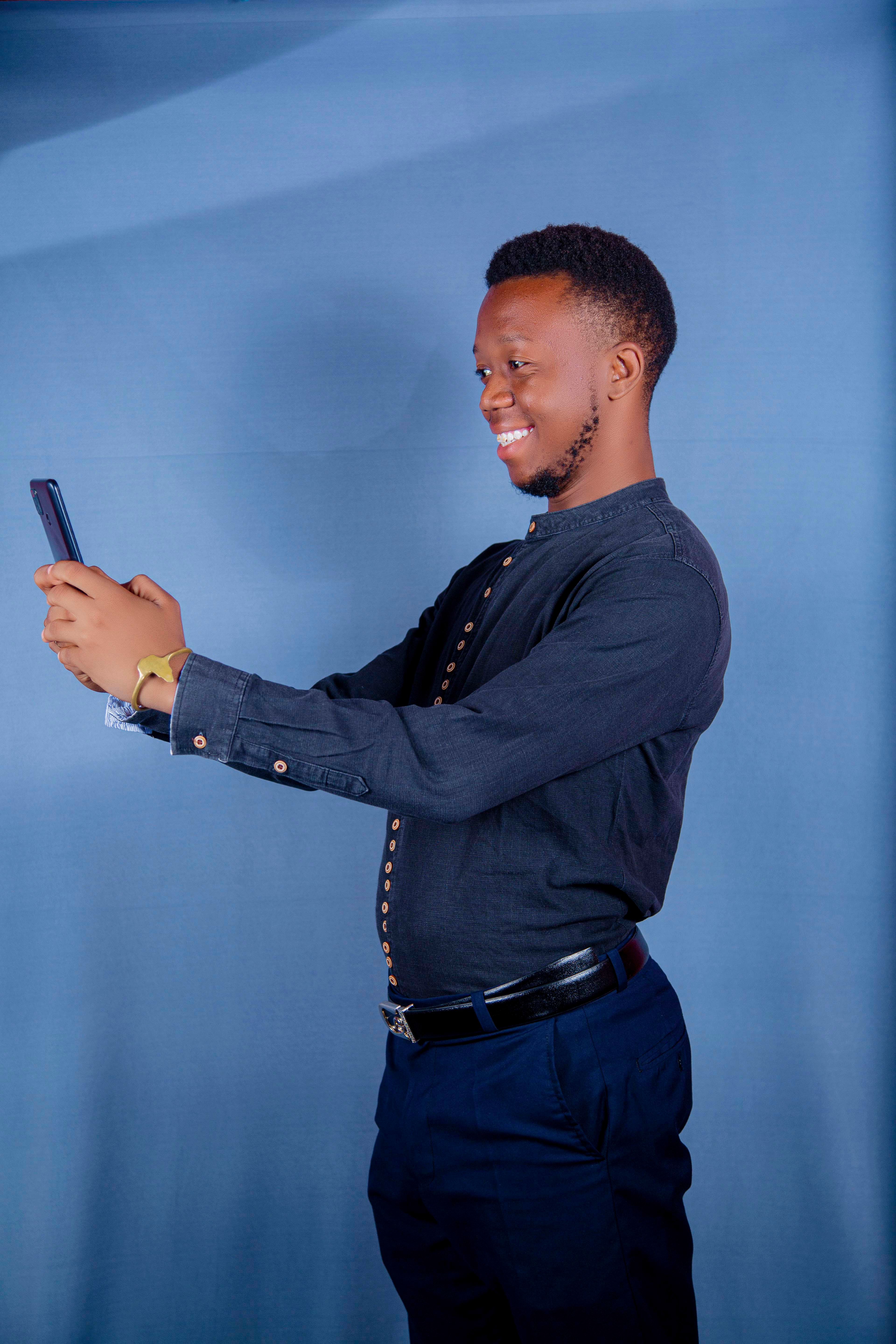 person Showing His Smartphone · Free Stock Photo