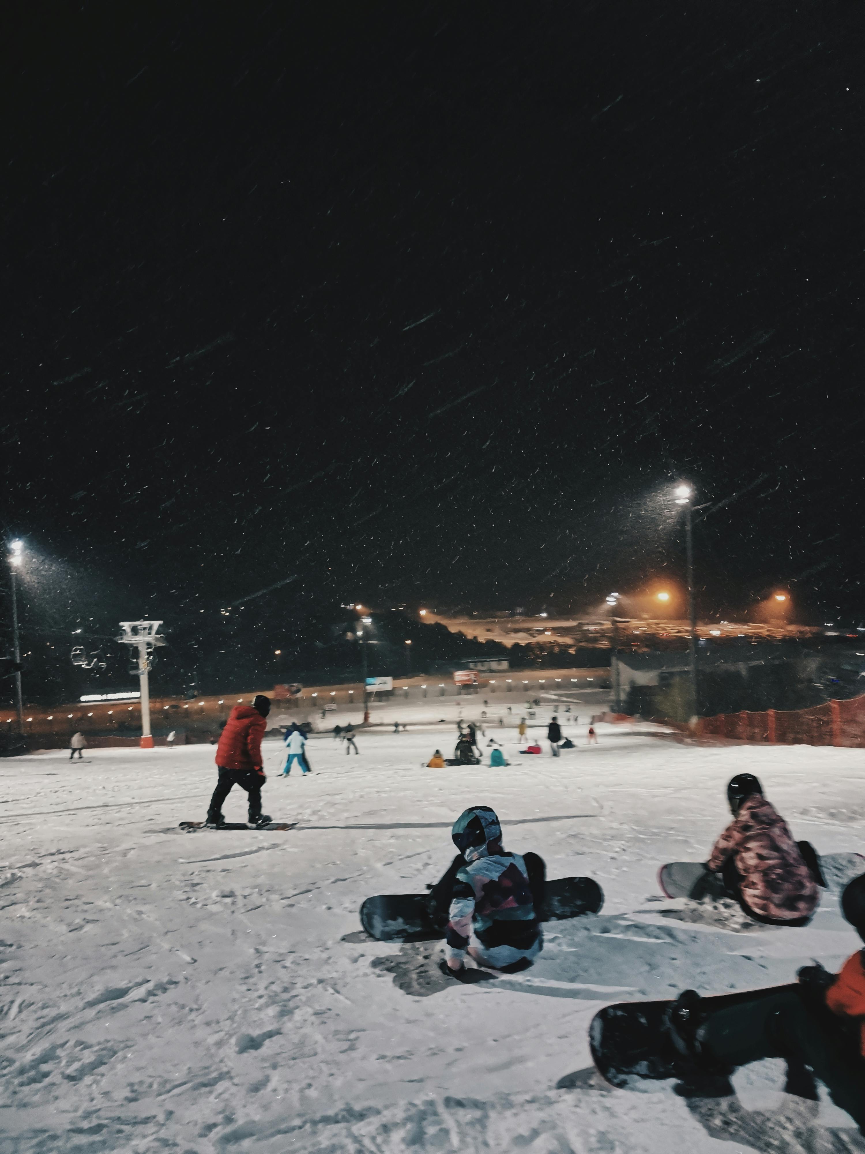 People Playing on the Snow Field · Free Stock Photo