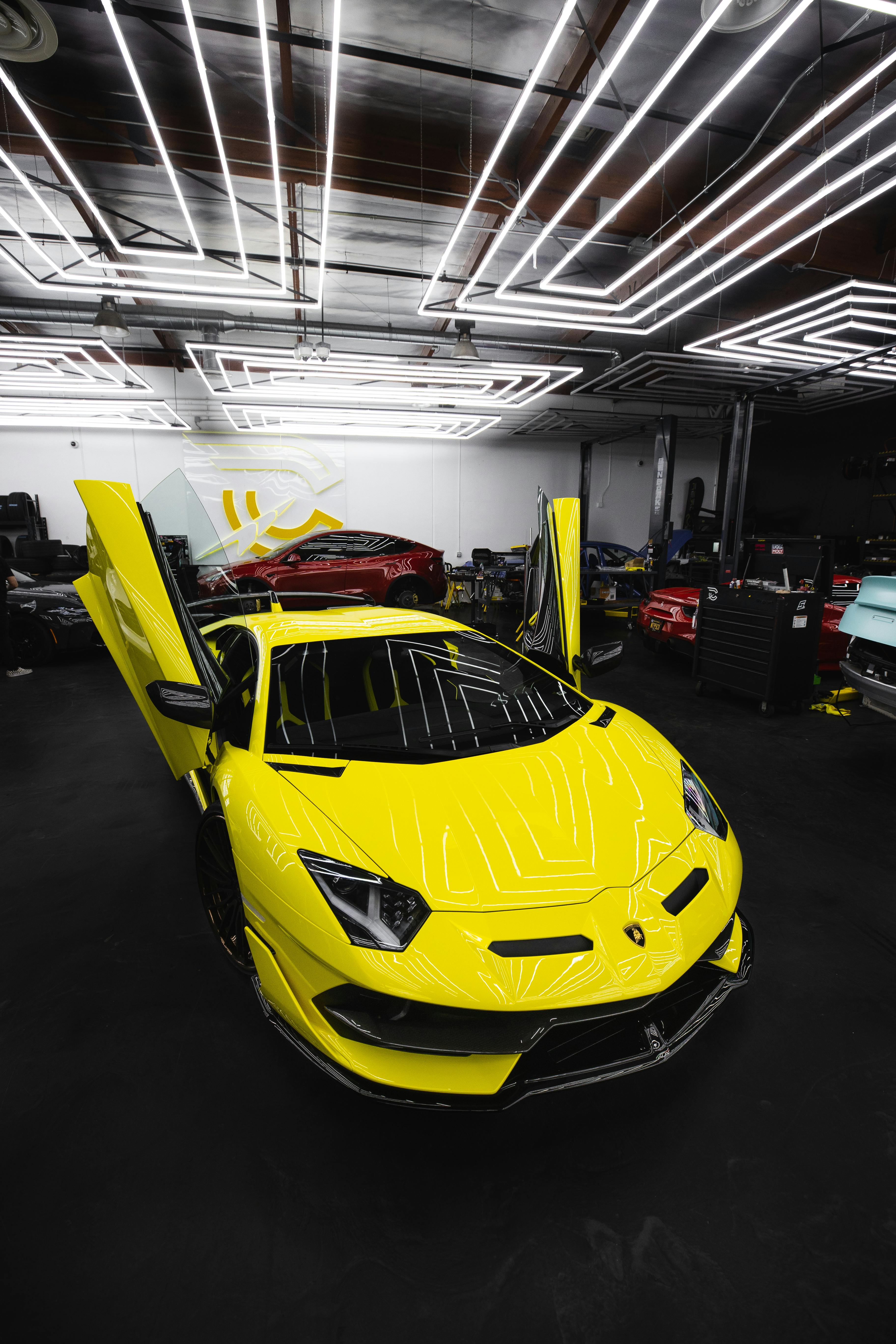 Yellow Car Parked in the Garage · Free Stock Photo