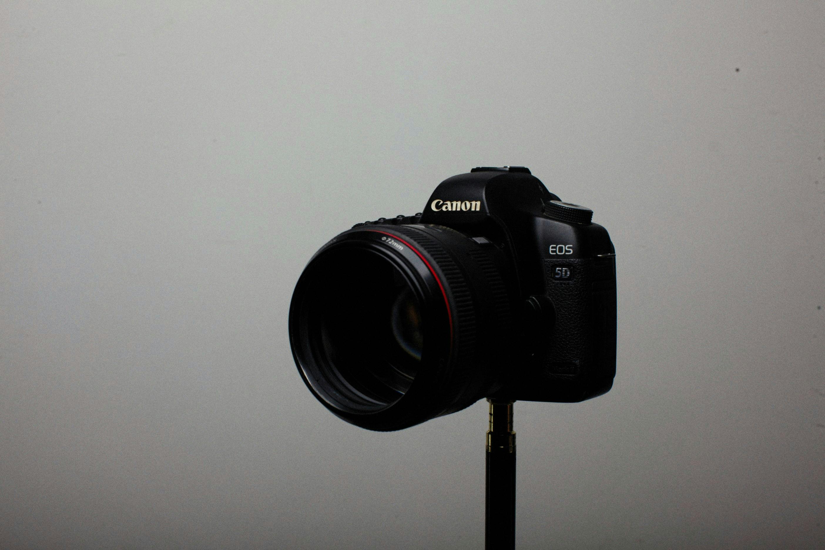 Black Canon Camera on a Stand · Free Stock Photo