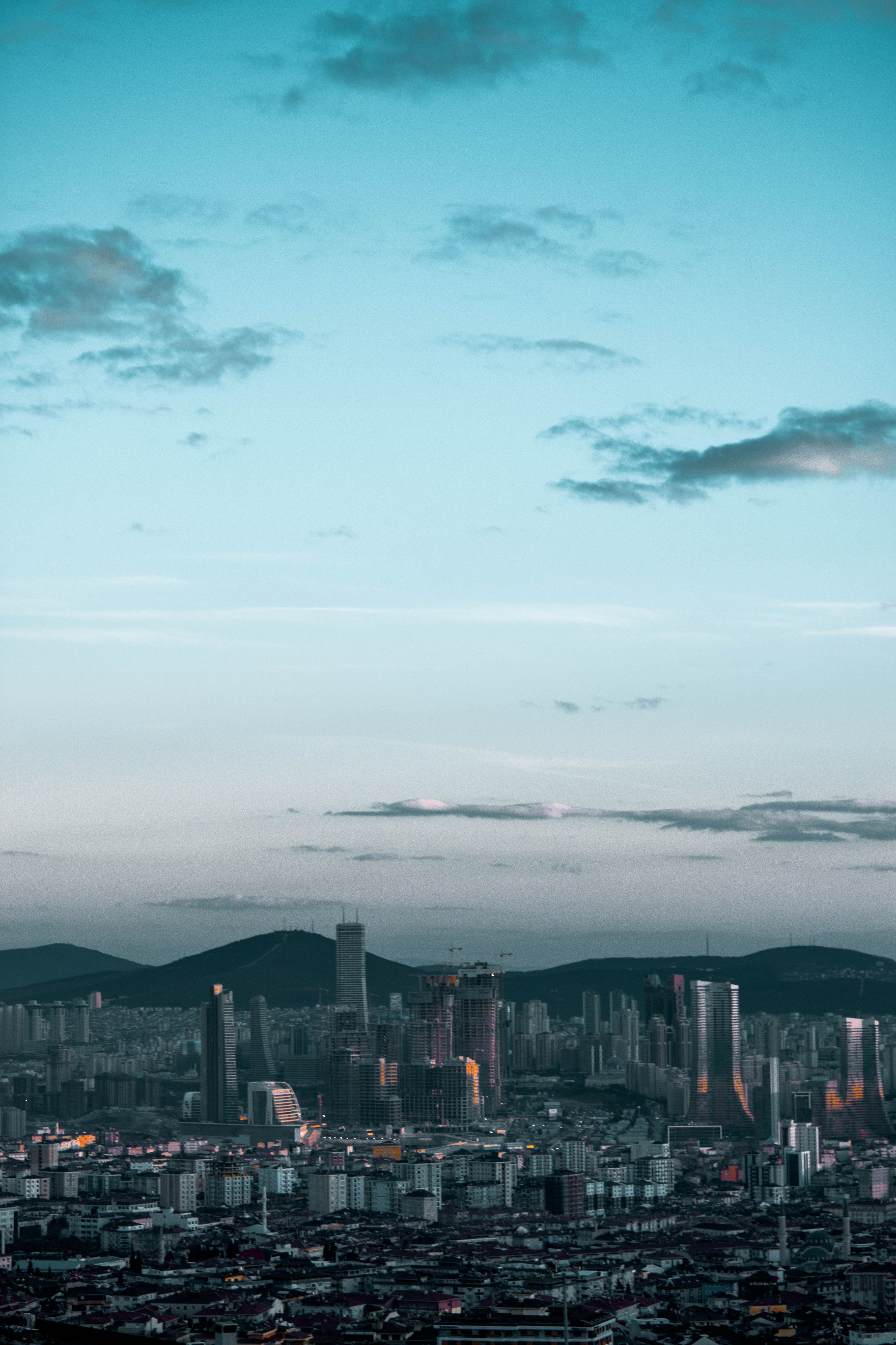 City Buildings Under the Blue Sky · Free Stock Photo